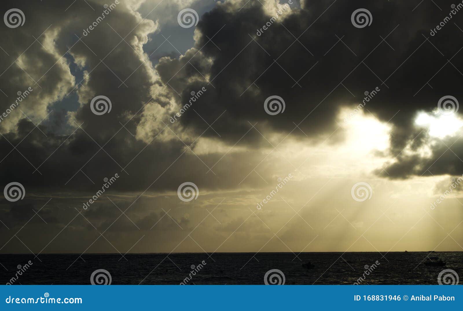 Rays of Light Shining through Dark Clouds . Dramatic Sky with Cloud ...