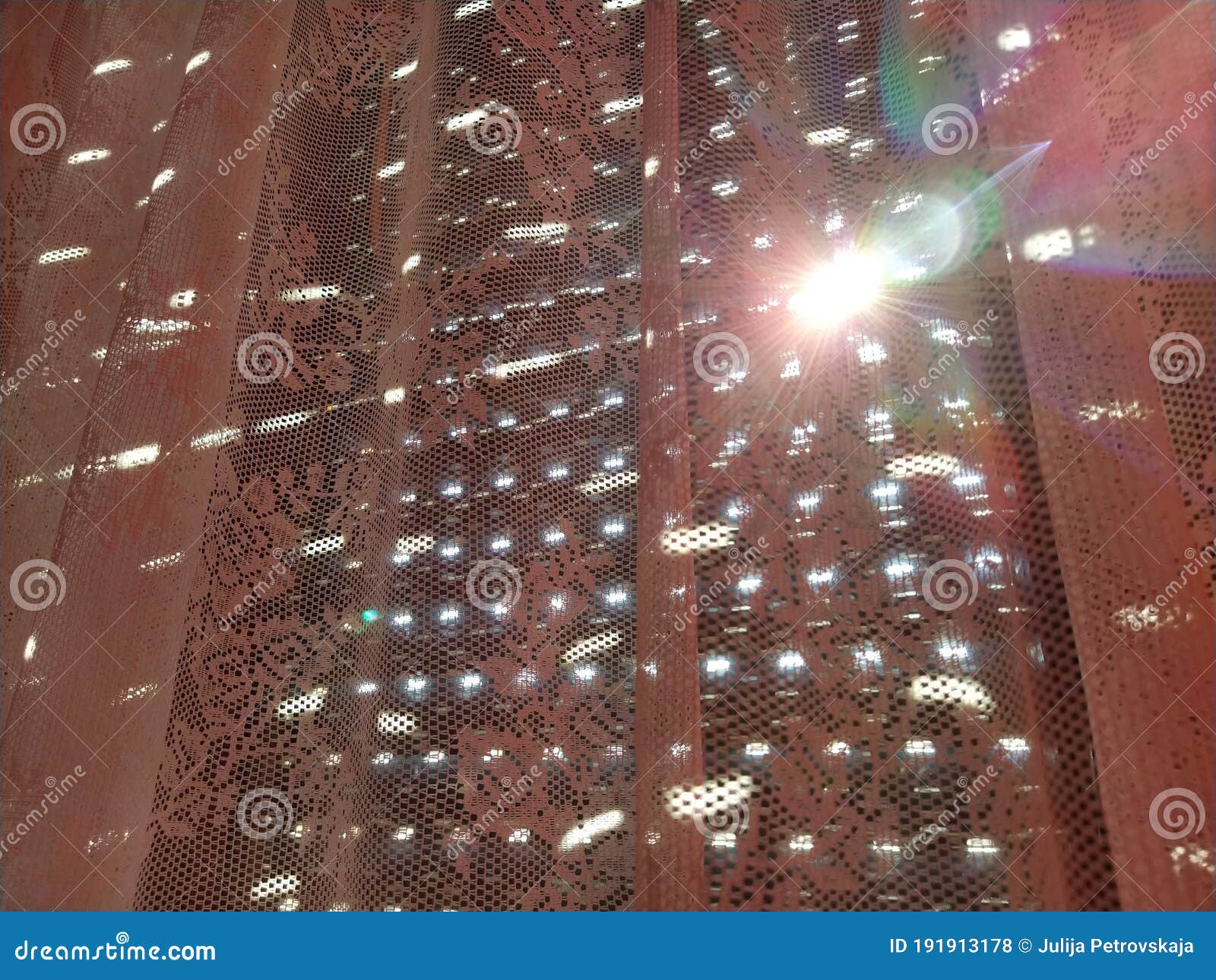 Rays of Light at Sunset Breaking through the Window Curtains. Closed ...