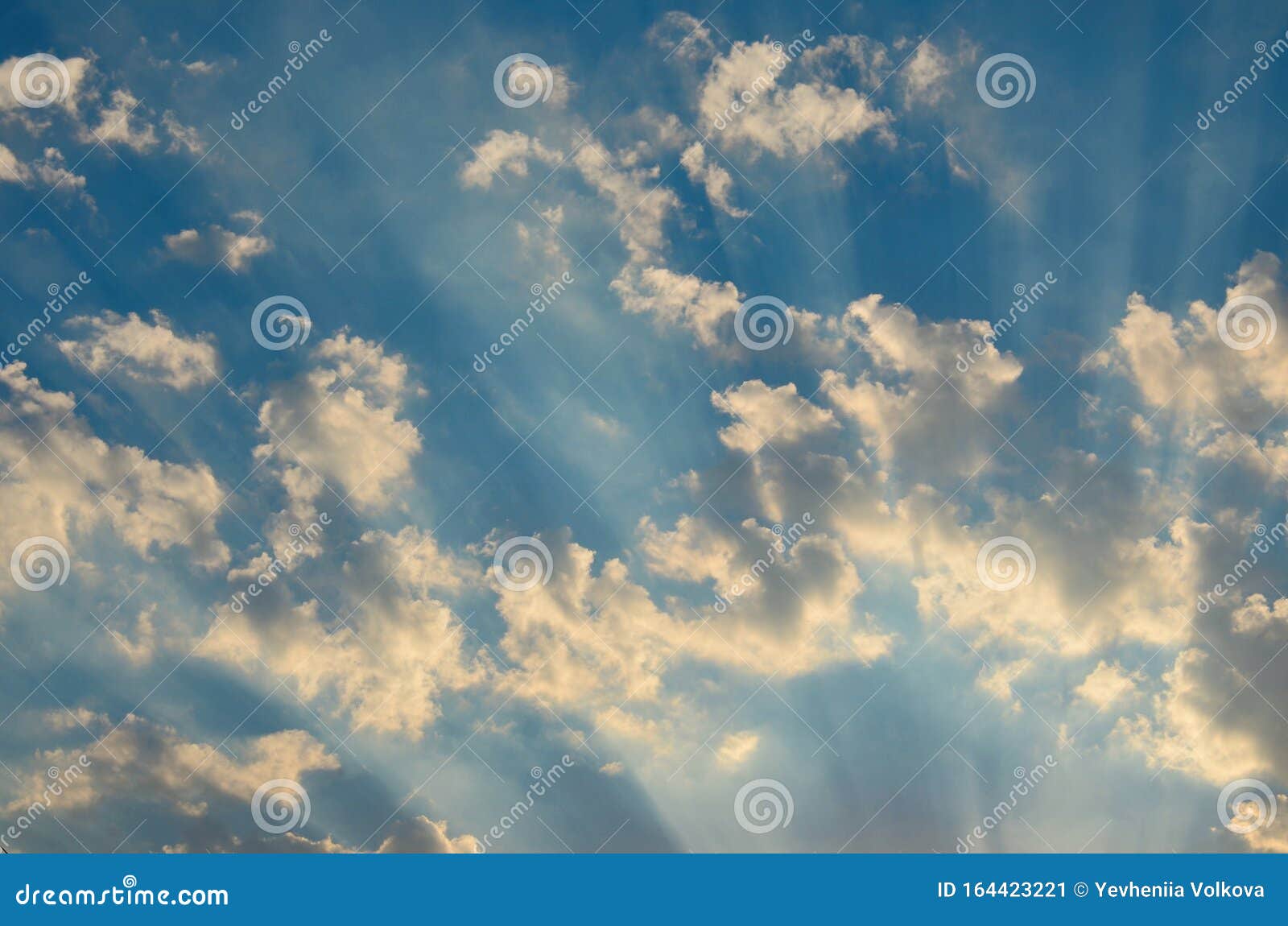 Rays of the Sun on a Blue Sky with Clouds Stock Image - Image of ...