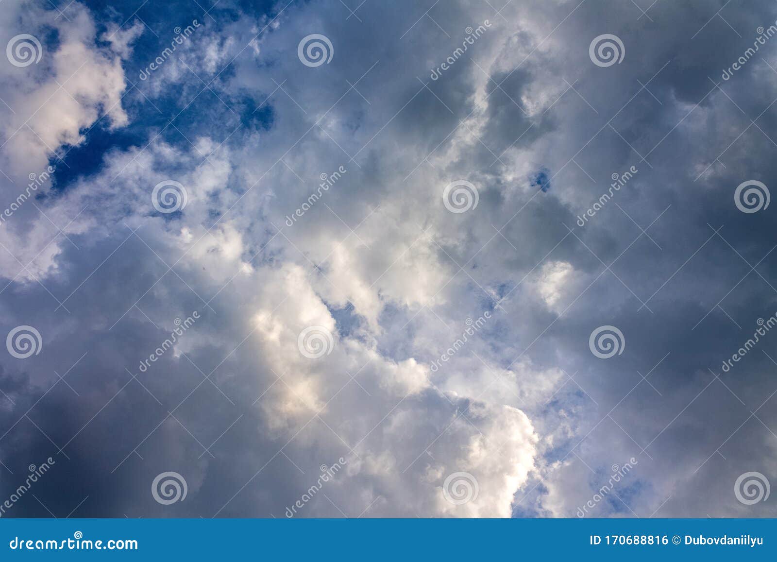 Rays of the Sun through the Blue Stormy Sky Stock Photo - Image of ...