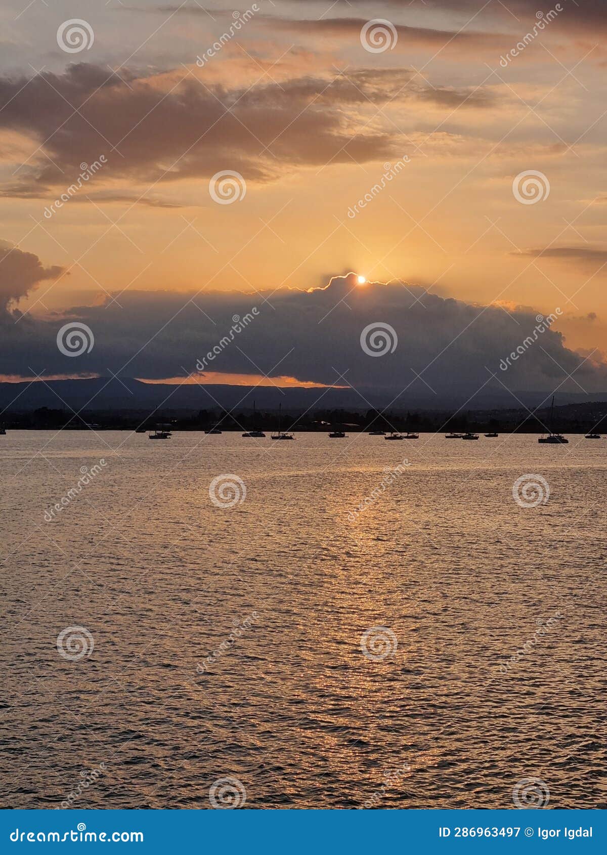The Rays of the Sun Break Out from Behind a Threatening Cloud and ...