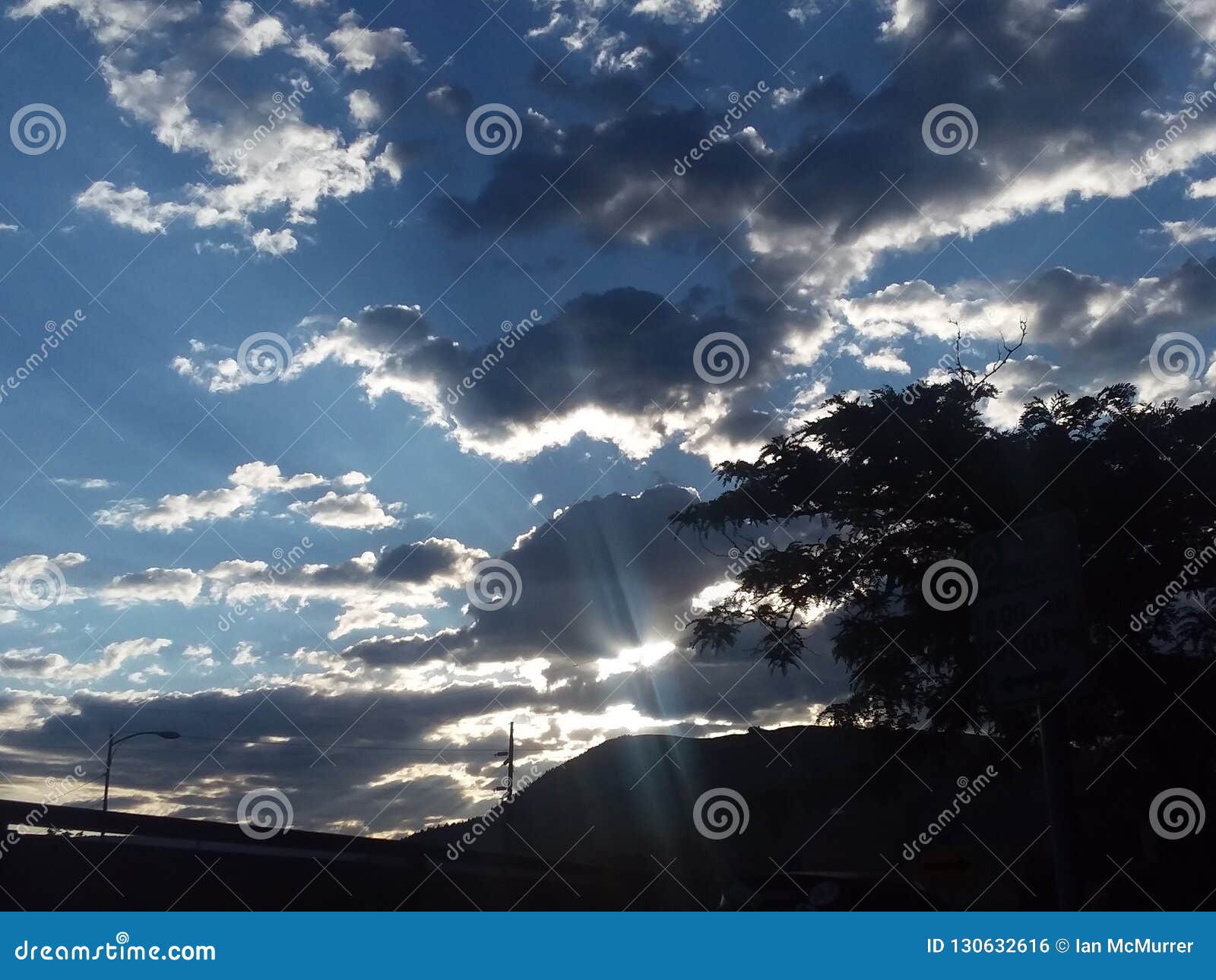 Rays of sun stock photo. Image of shining, light, dark - 130632616