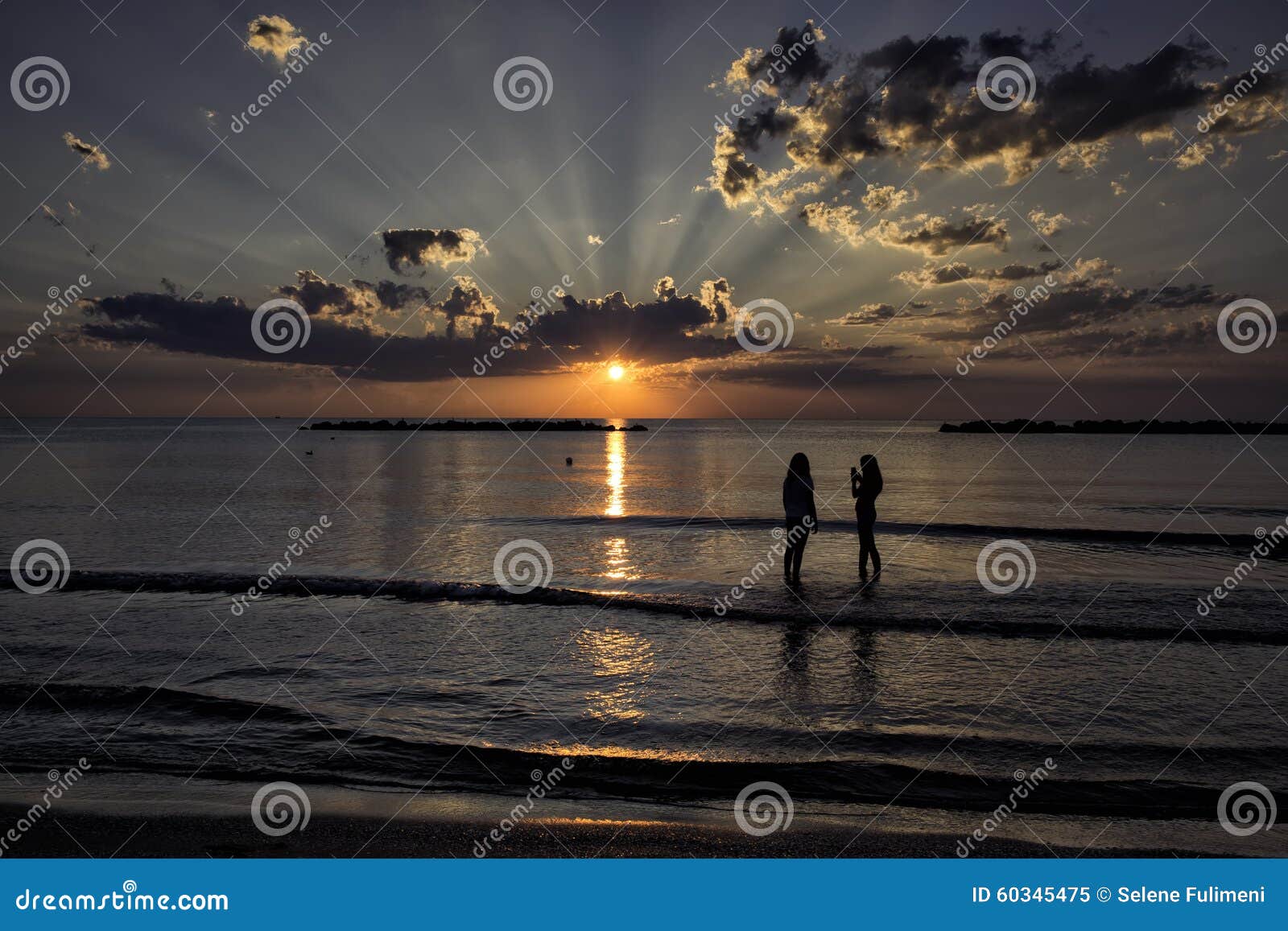 Rays of sun at dawn stock image. Image of reflection - 60345475