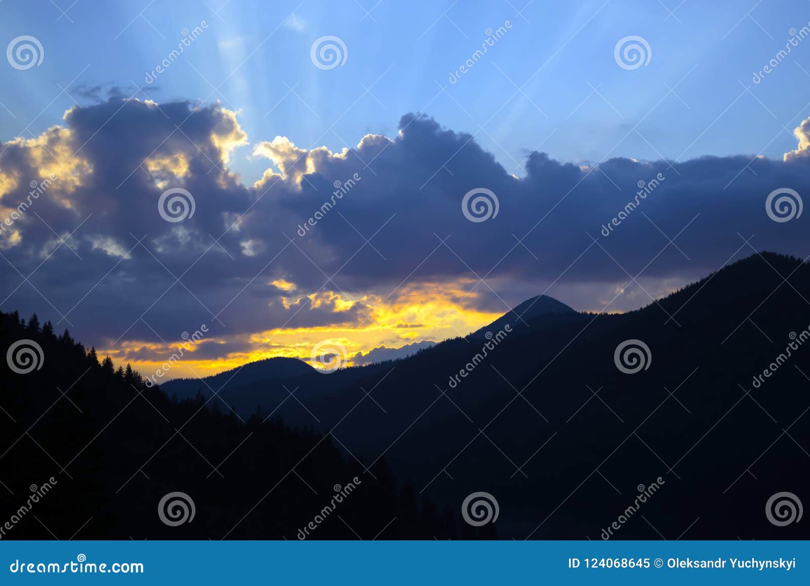 Rays of the Sun Making Their Way through the Clouds Against the ...