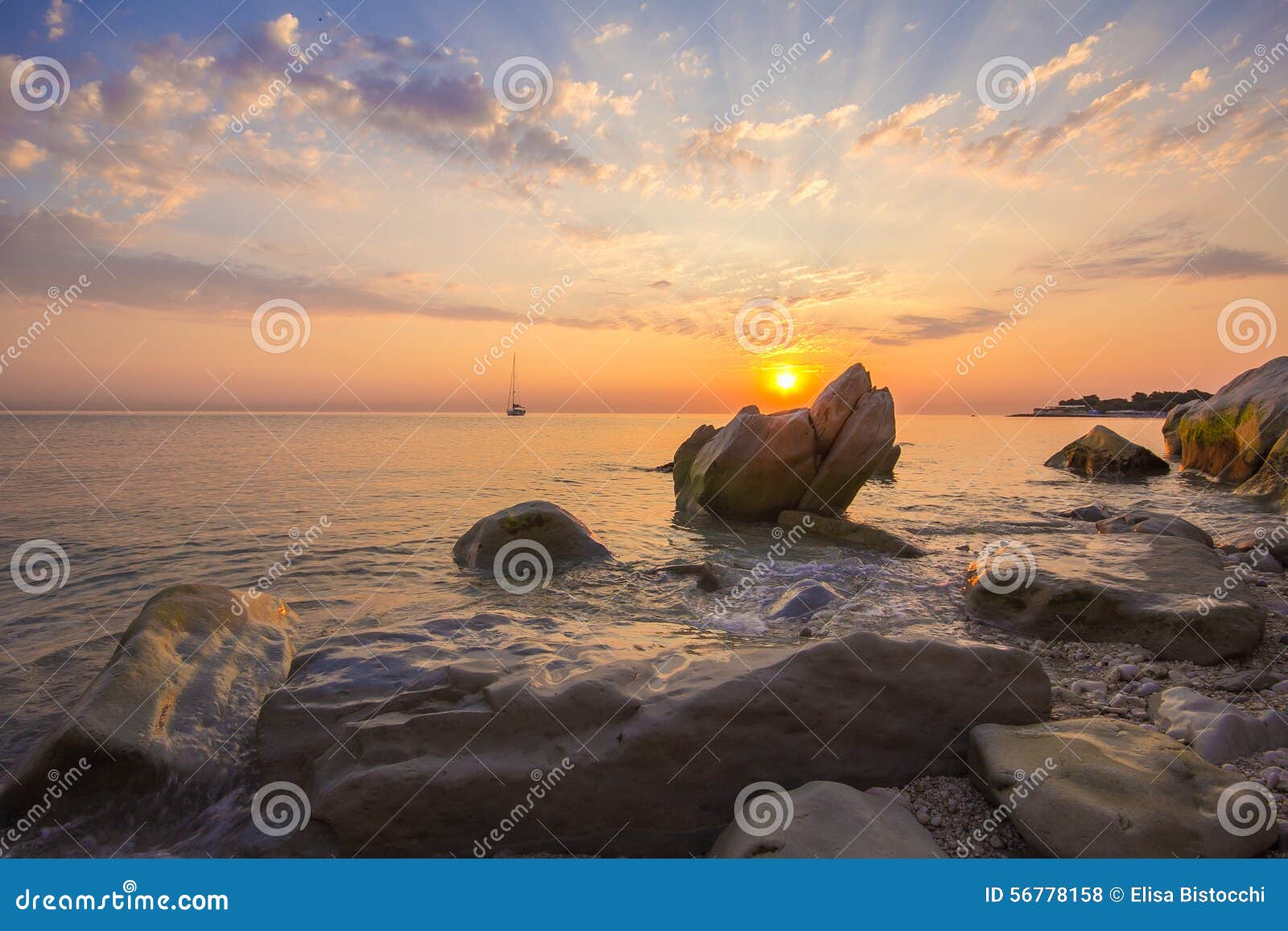 Rays of Sun on the Sea Rocks Stock Photo - Image of lights, beautiful ...
