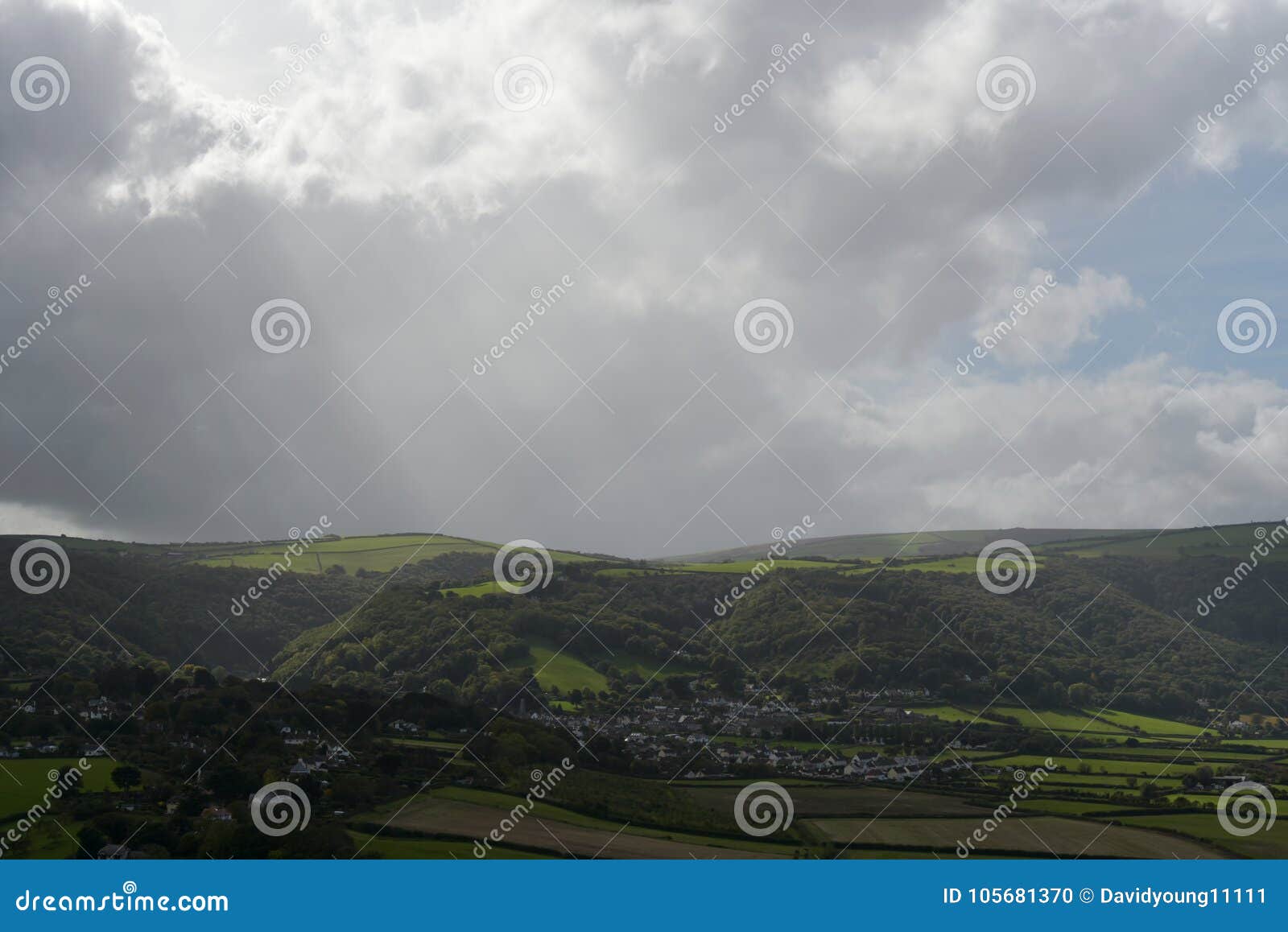 Rays of Sun Slant Down Over Porlock in Exmoor, North Devon Stock Photo ...