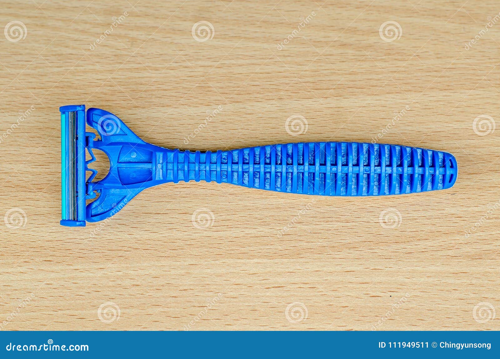 Razor Blade Shows the Front and Back of a Blue Handle Stock Image ...