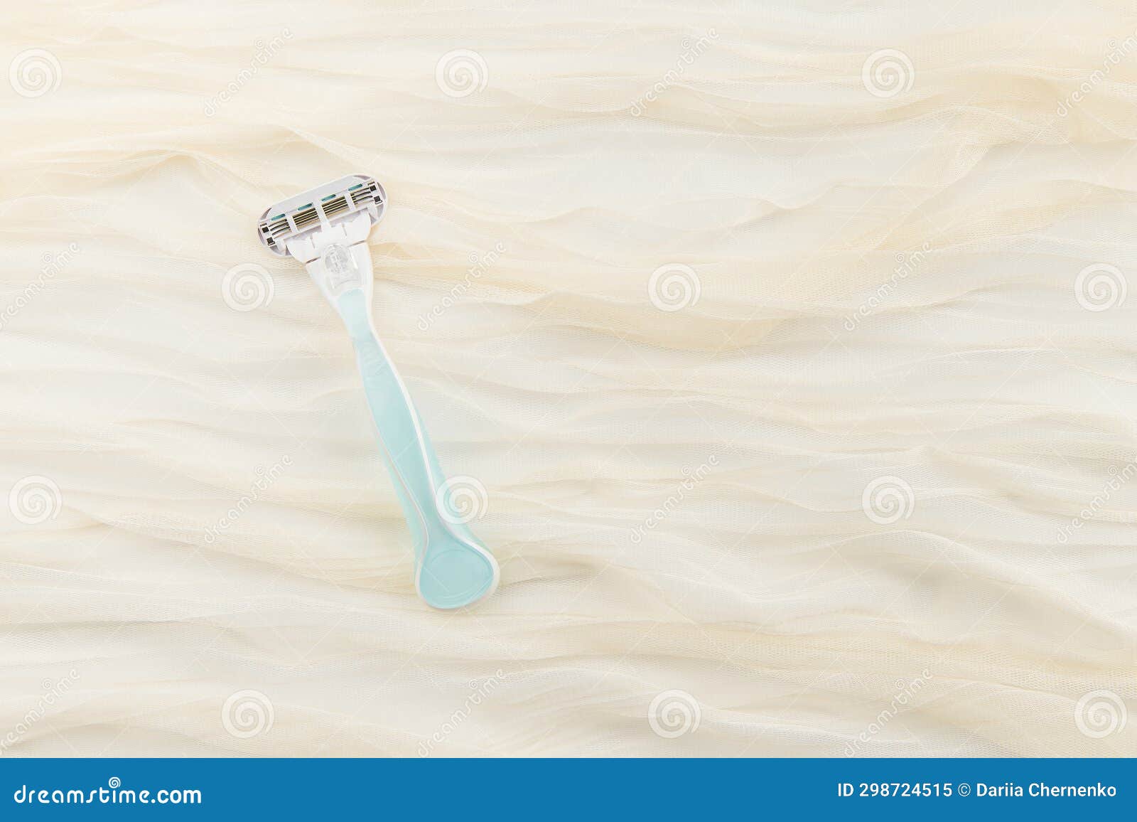 Razor on Soft Fabric. Tactile Elegance, Transforming Your Grooming ...