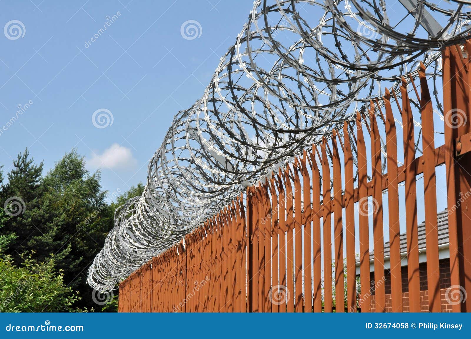 Razor Wire Fence stock photo. Image of defensive, protection - 32674058