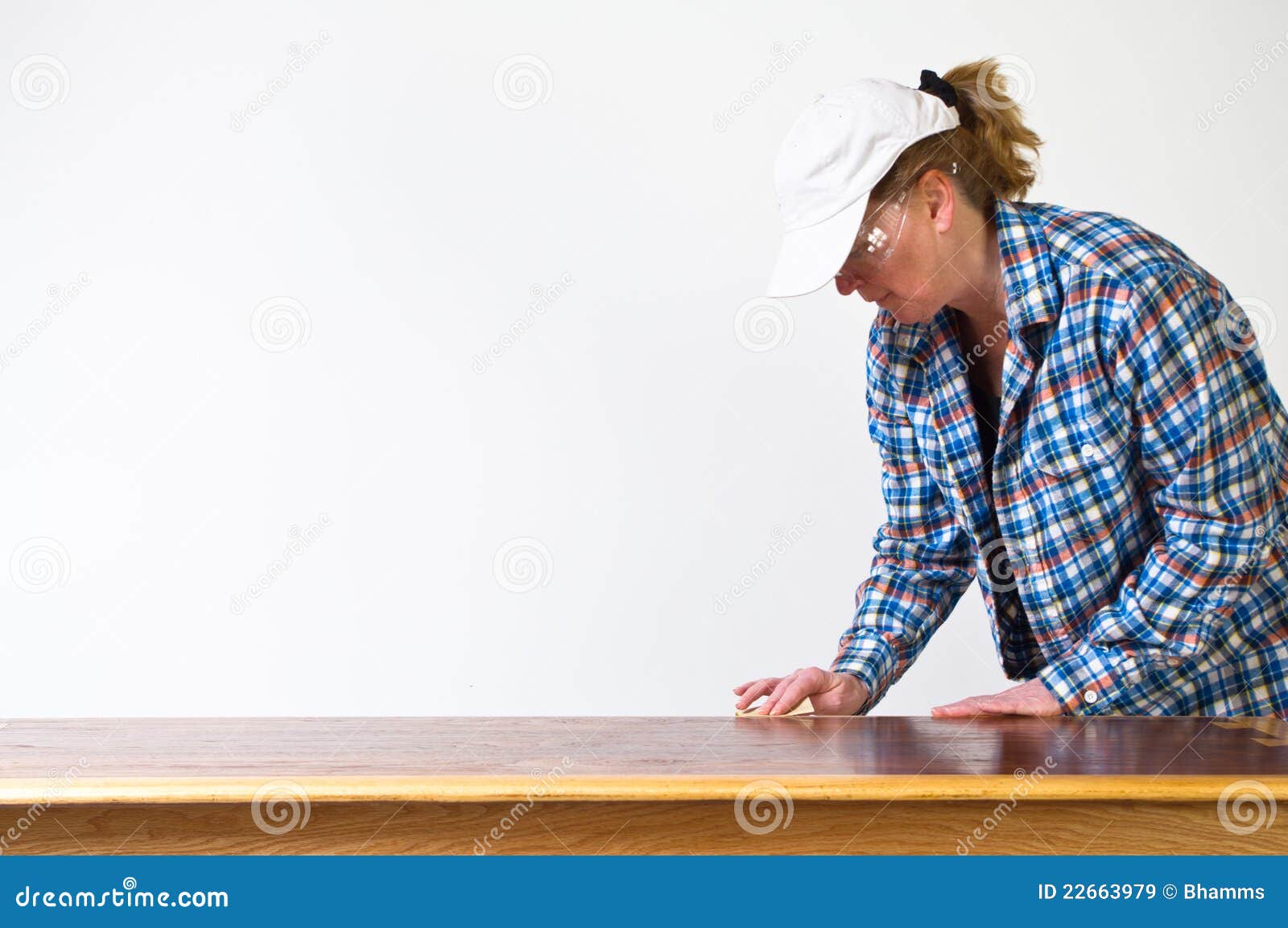 Re-finishing a table stock image. Image of brushing, expertise - 22663979