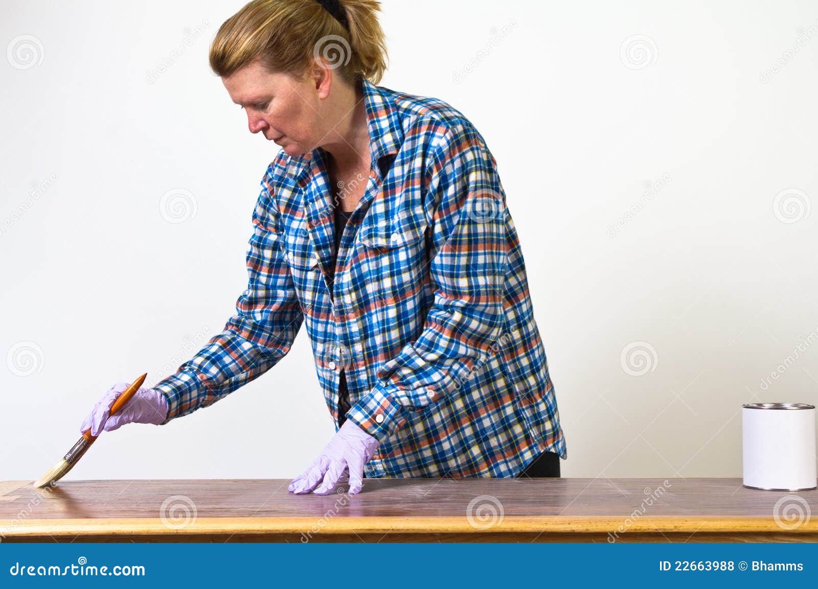 Re-finishing a table stock photo. Image of brushing, painter - 22663988