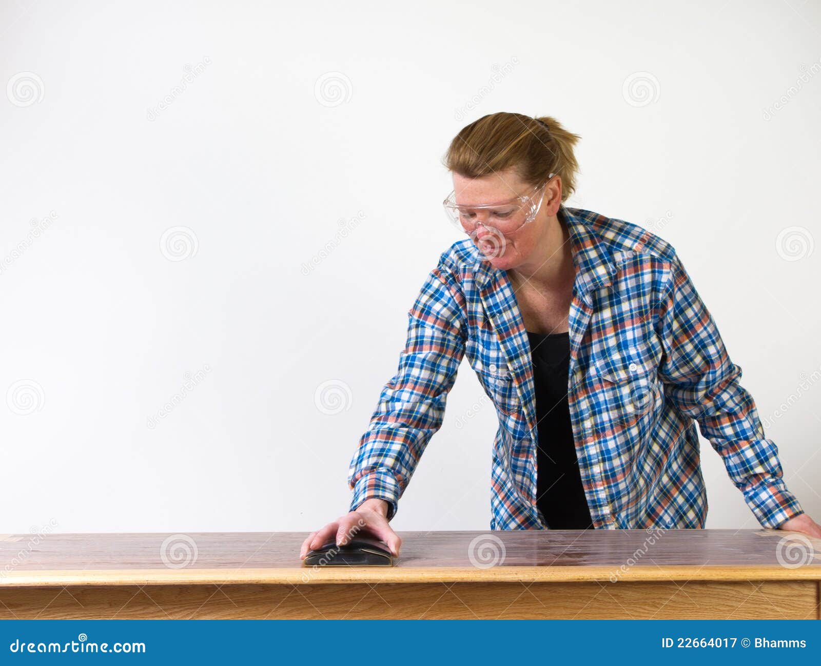 Re-finishing a table stock image. Image of holding, blond - 22664017