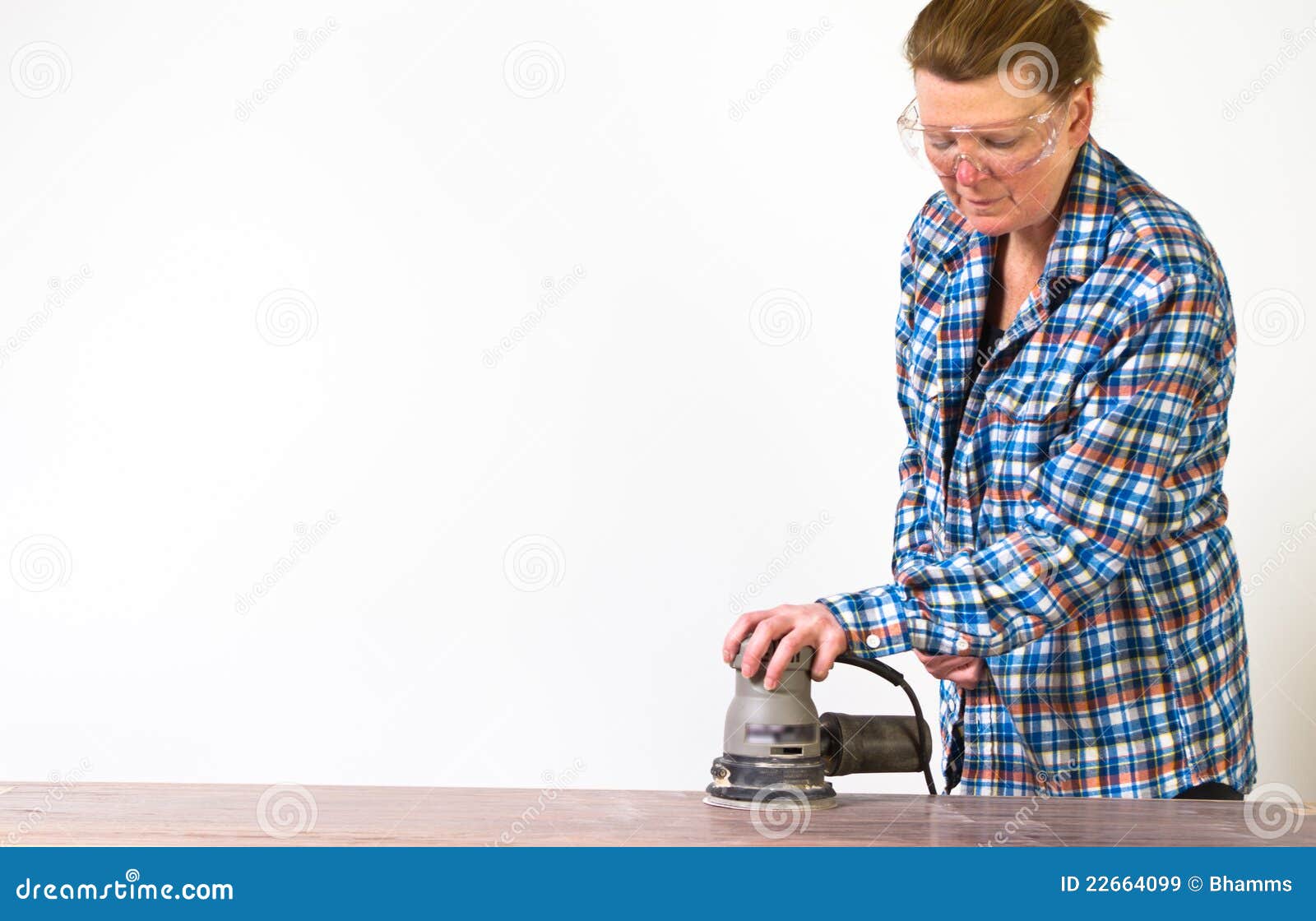 Re-finishing a table stock image. Image of carpenter - 22664099