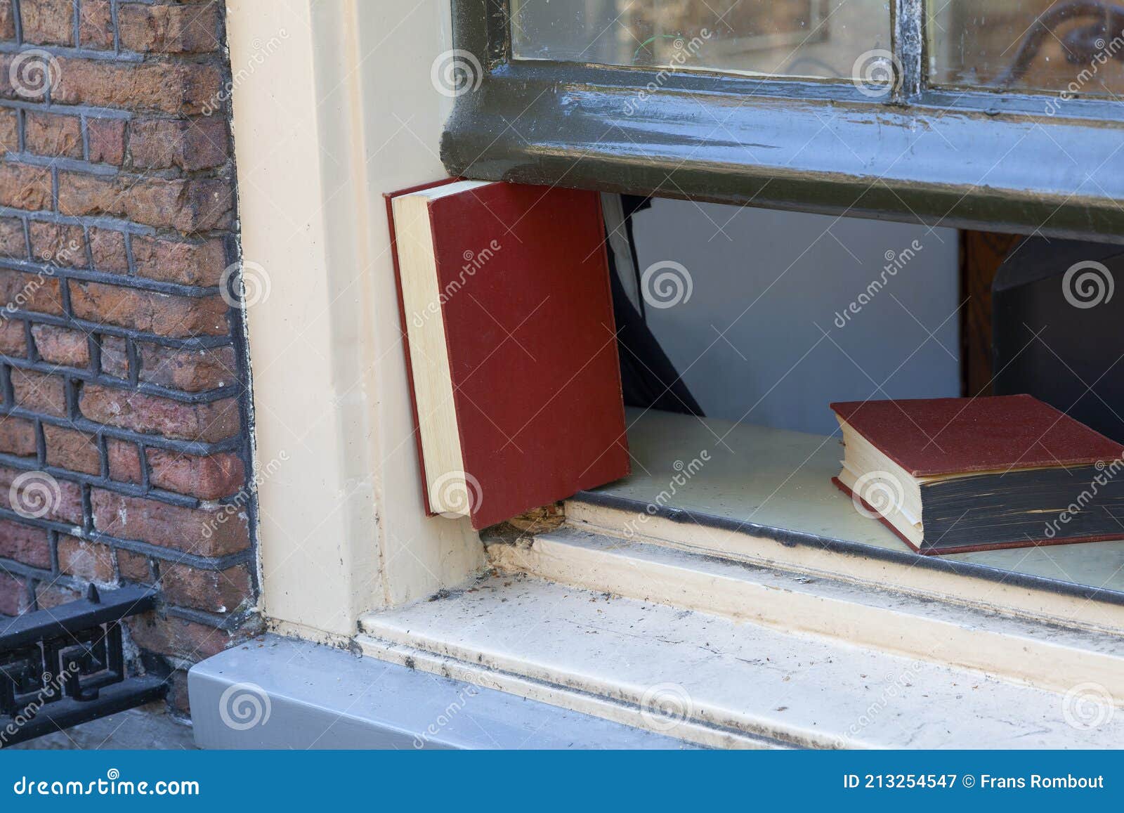 Re Use an Old Book To Keep the Window Open Close Up Stock Image - Image ...