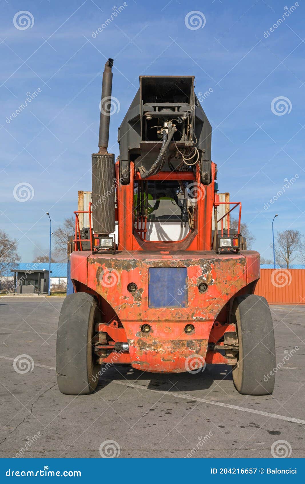 Reach Stacker Lifting Container. Forklift Truck Handling Container At ...