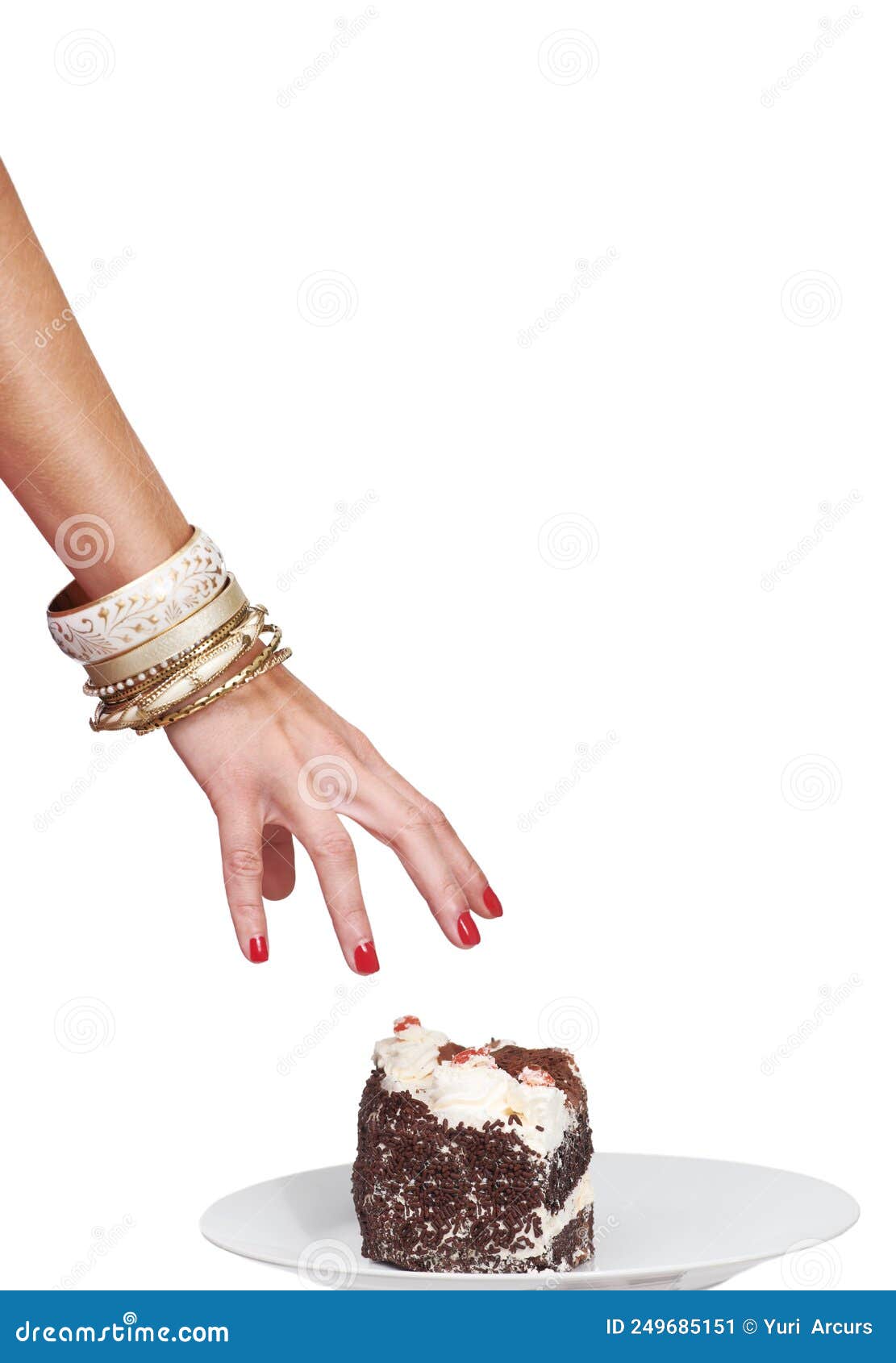 Reaching for Her Delicious Prize. Cropped Image of a Womans Hand ...