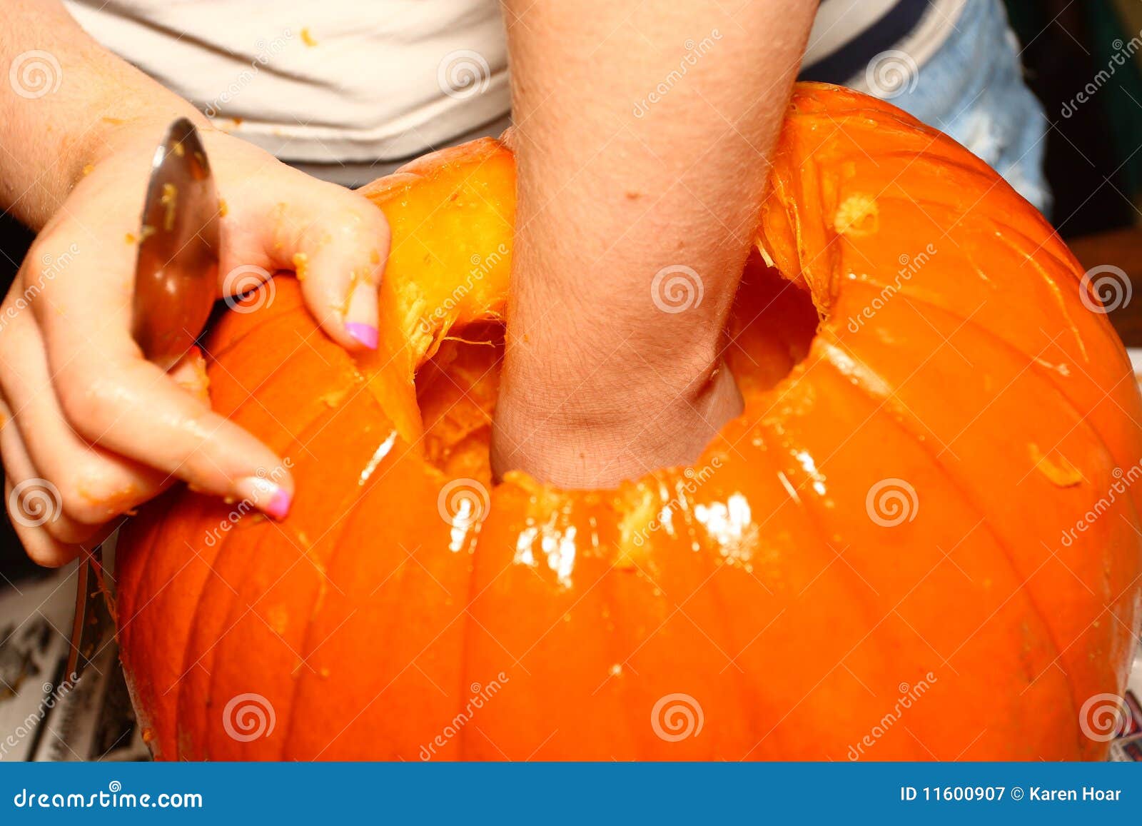 Reaching into the Pumpkin stock image. Image of autumn - 11600907