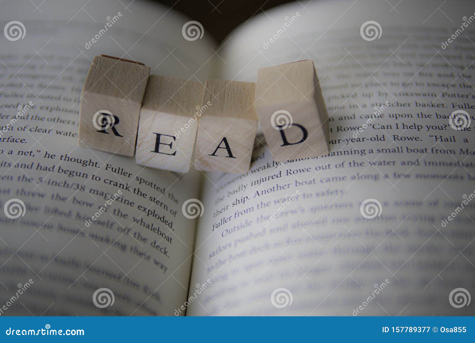 Read in Block Letter on an Open Book Stock Image - Image of wood ...