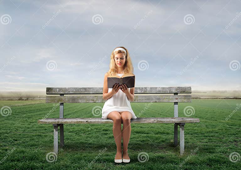 Read in the park stock image. Image of garden, teen, lawn - 16167291