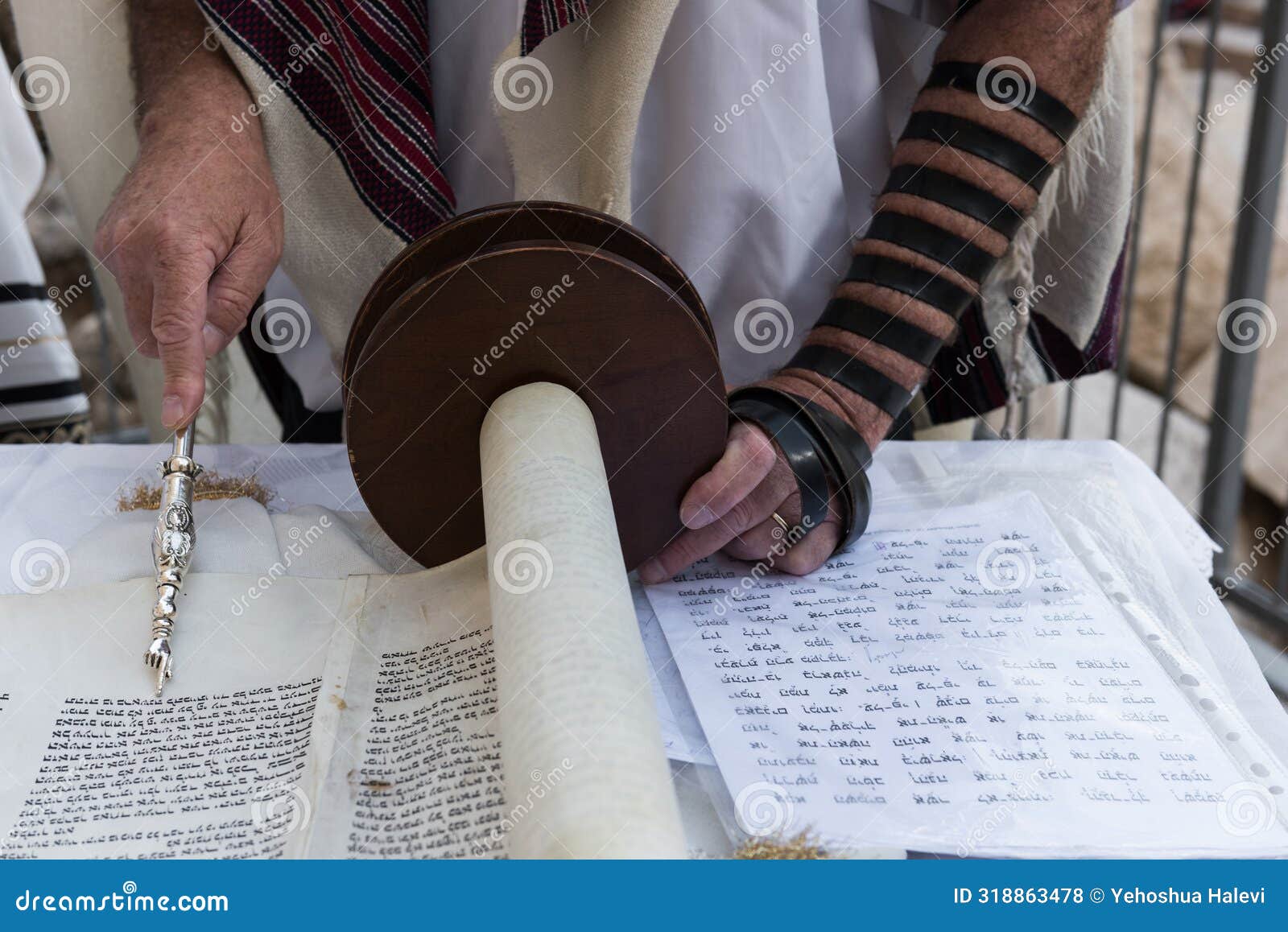 A Reader of the Torah Uses a Yad or Pointer As a Guide Stock Photo ...