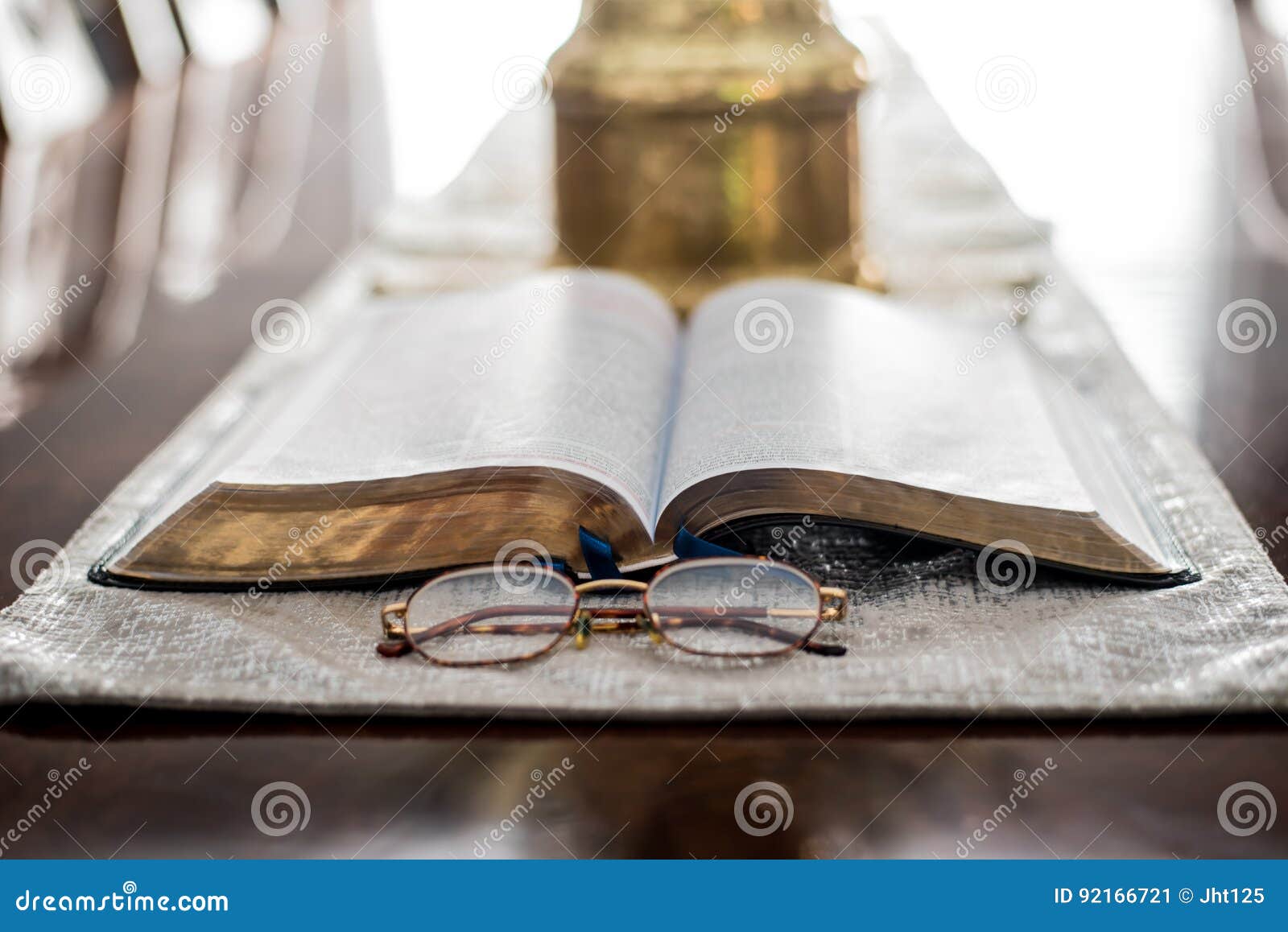 Reading the Bible with Reading Glasses Stock Image - Image of ...