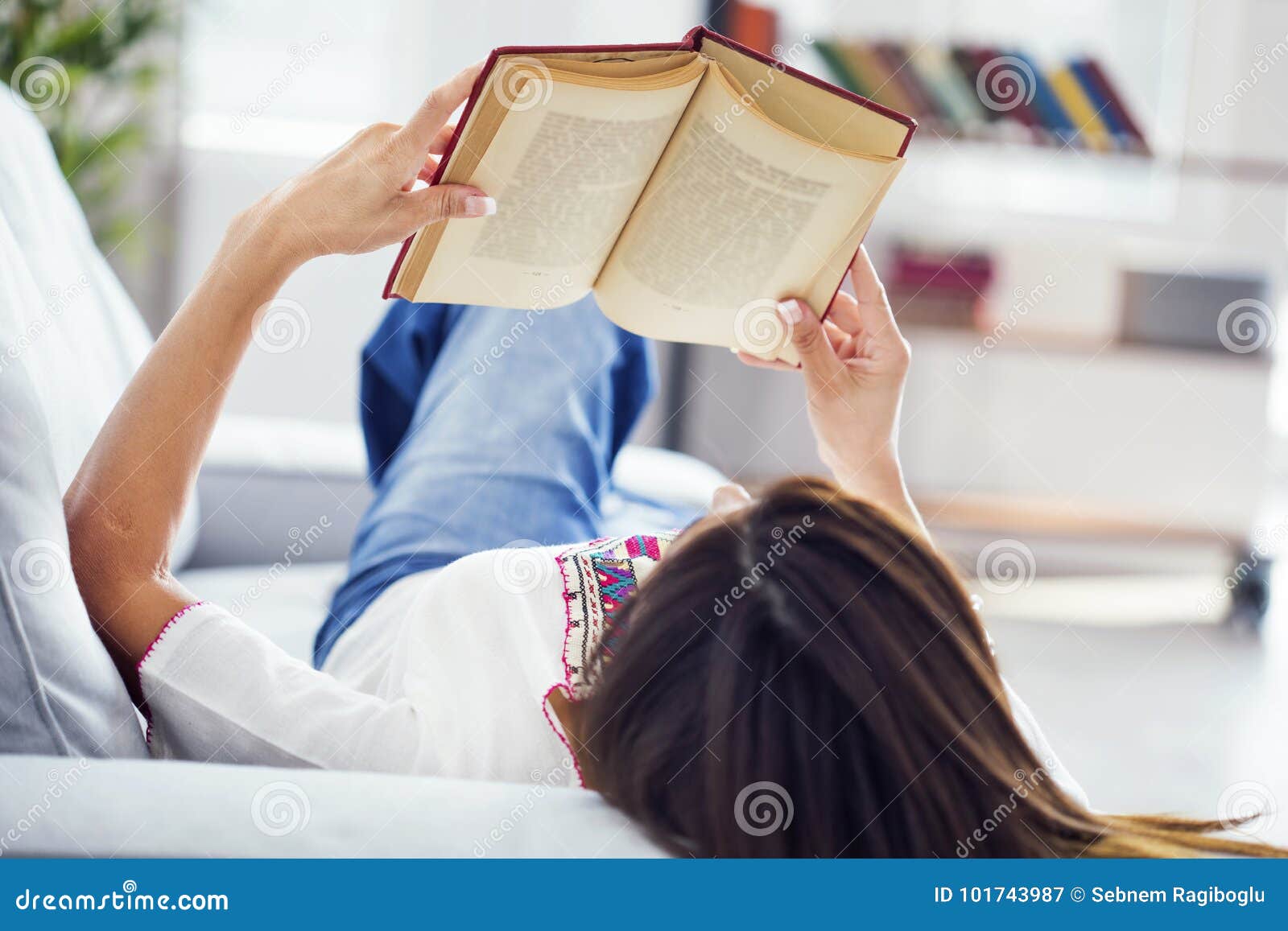 Reading book on home stock image. Image of home, female - 101743987
