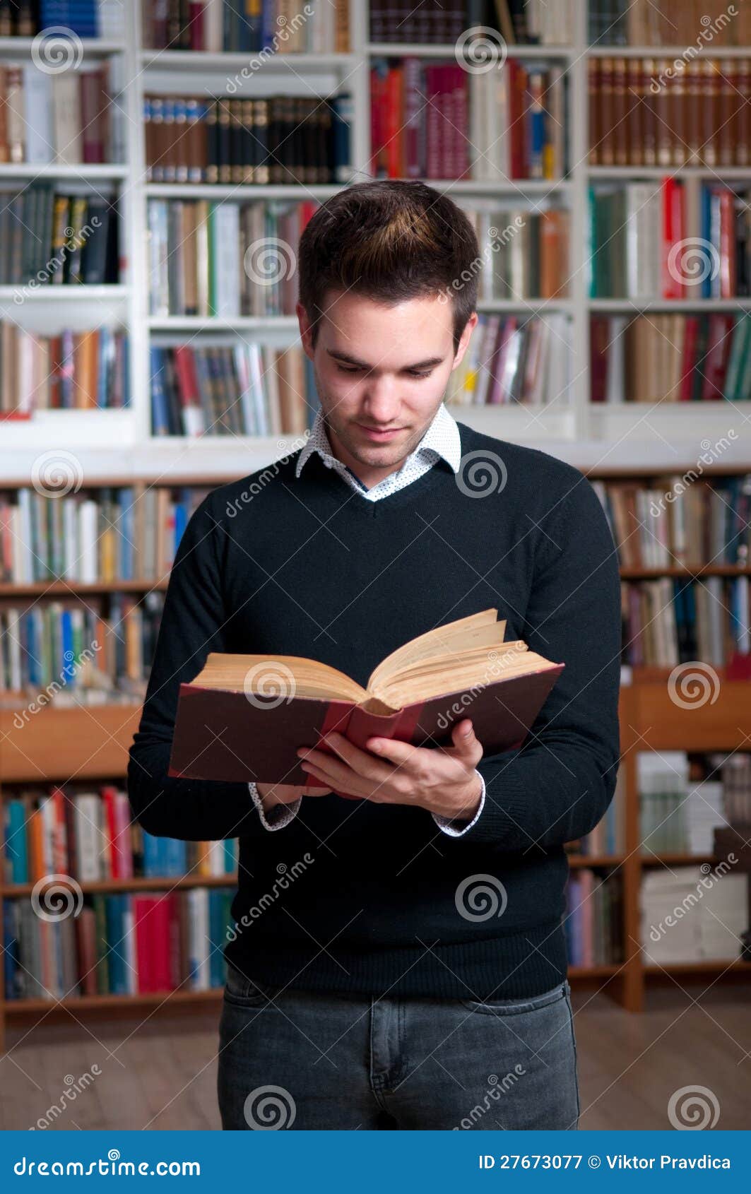 Reading book in library stock image. Image of searching - 27673077