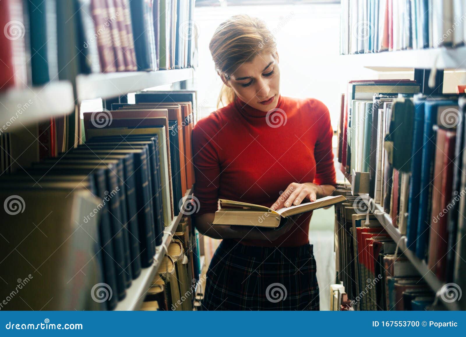 Student Reading a Book in Library Stock Photo - Image of lifestyle ...