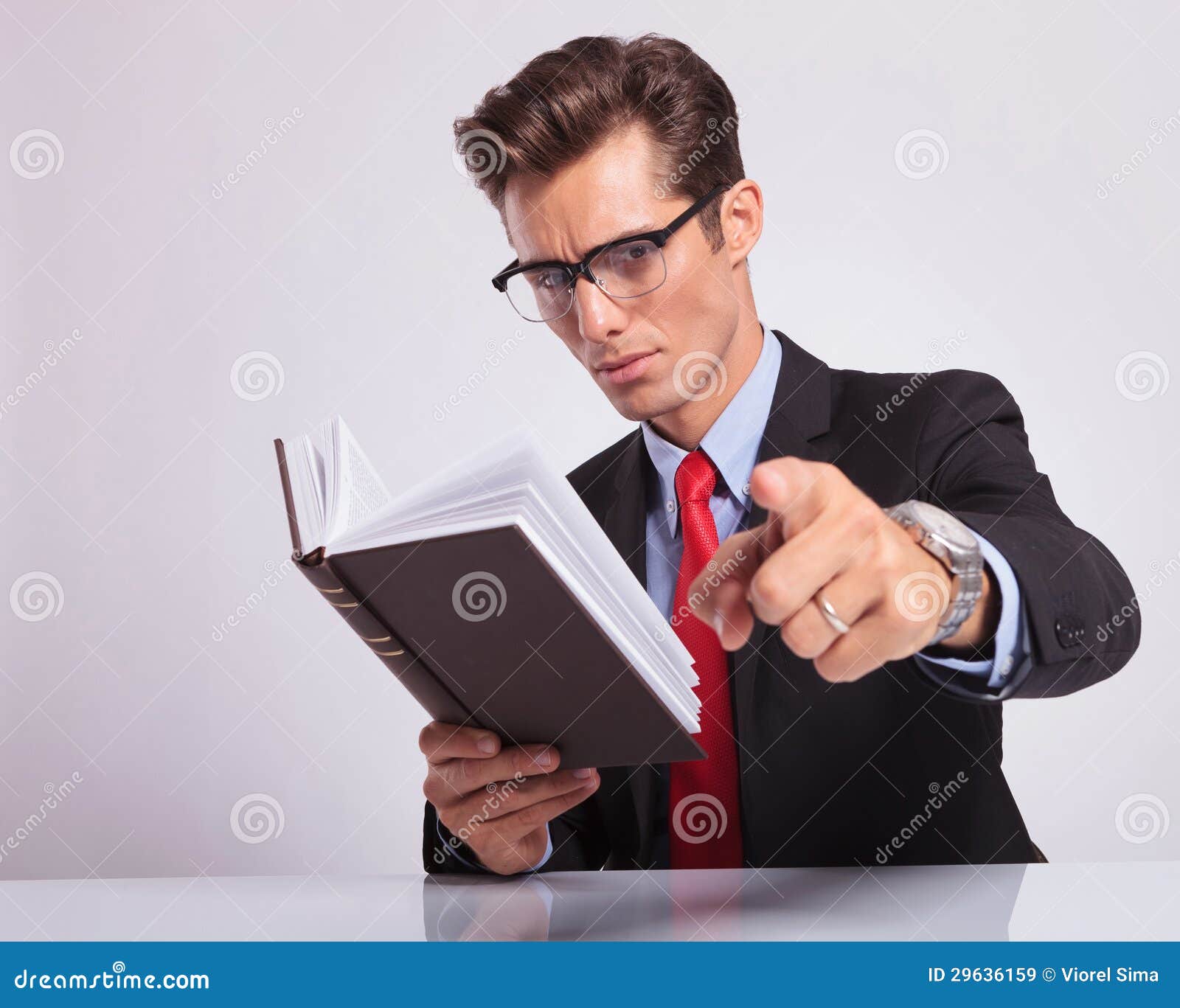 Reading a Book & Pointing Stock Image - Image of imaginary, people ...
