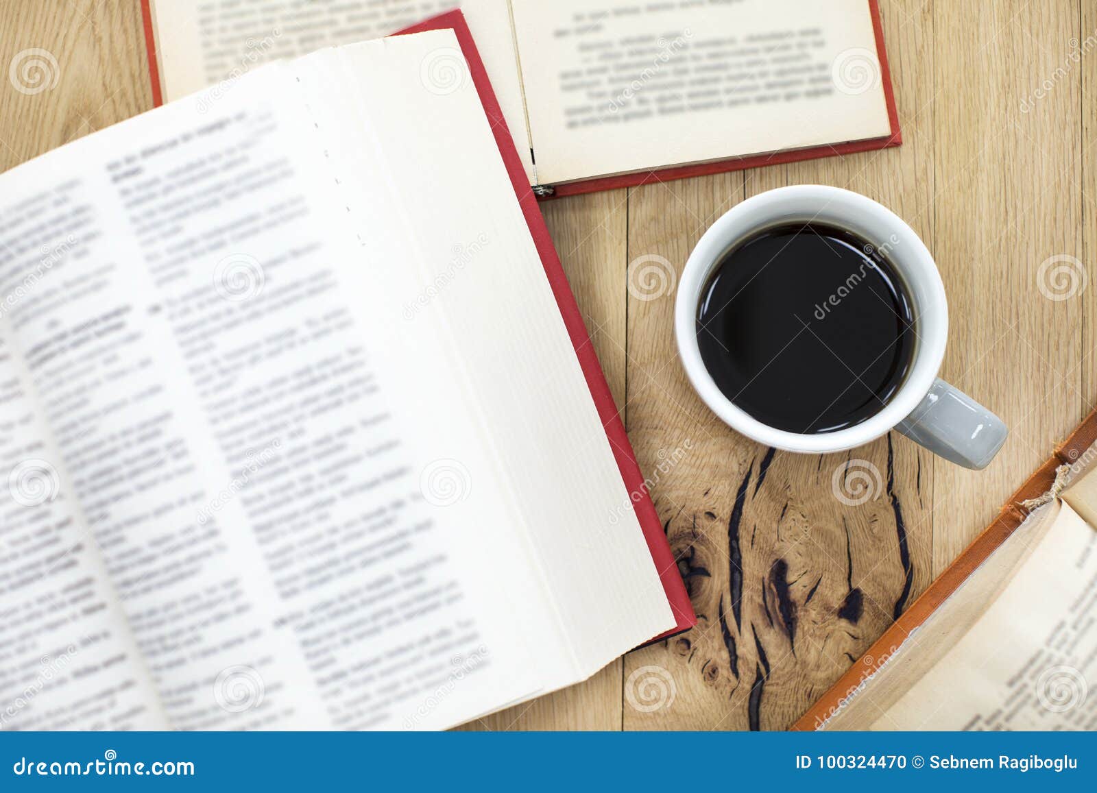 Reading book on table stock photo. Image of library - 100324470