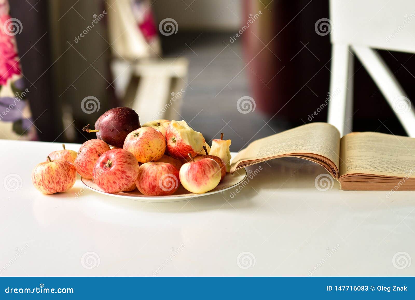 Reading Books is a Healthy Mind, Apples are Healthy Food. Stock Image ...
