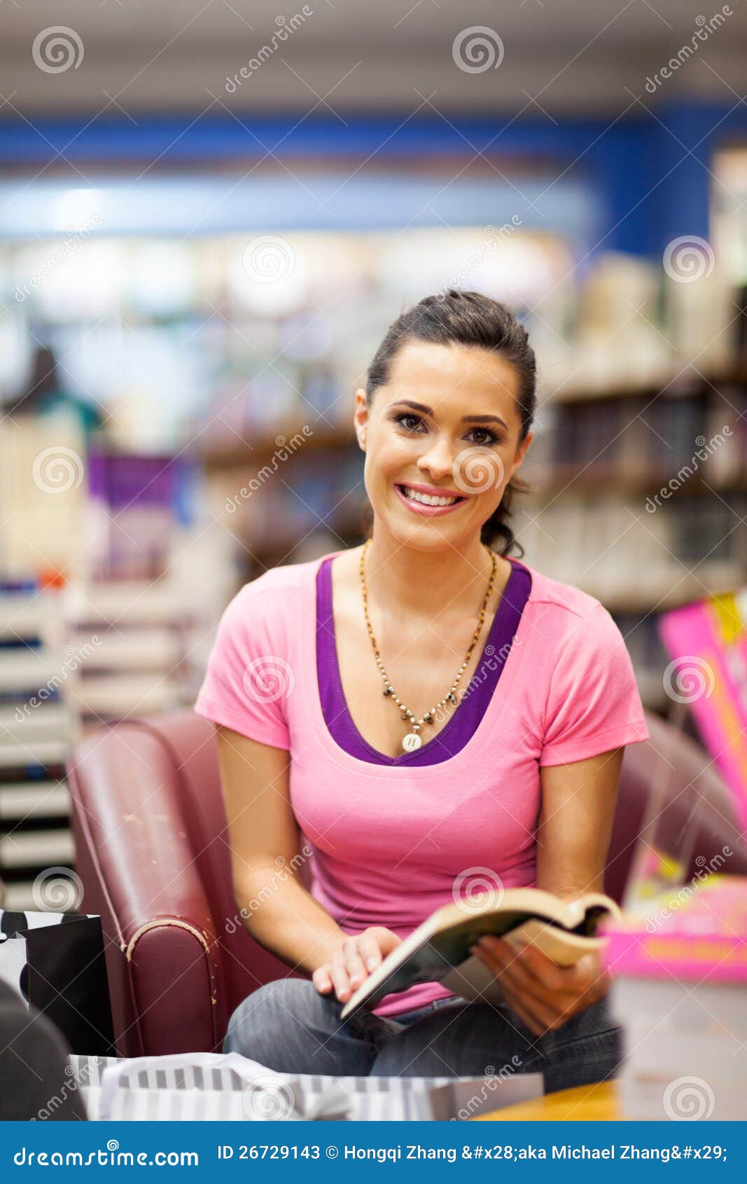 Reading in bookstore stock image. Image of reading, joyful - 26729143