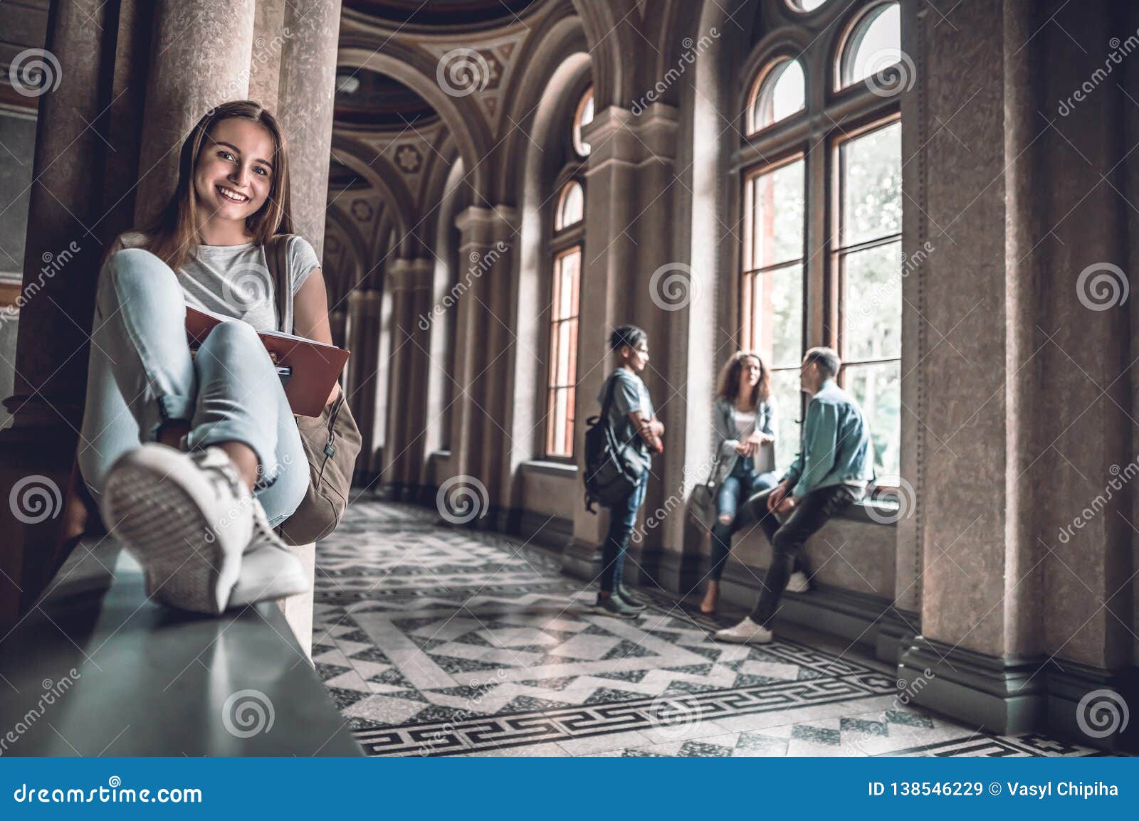 Reading during a Break.Beautiful Student Preparing To the Lesson while ...