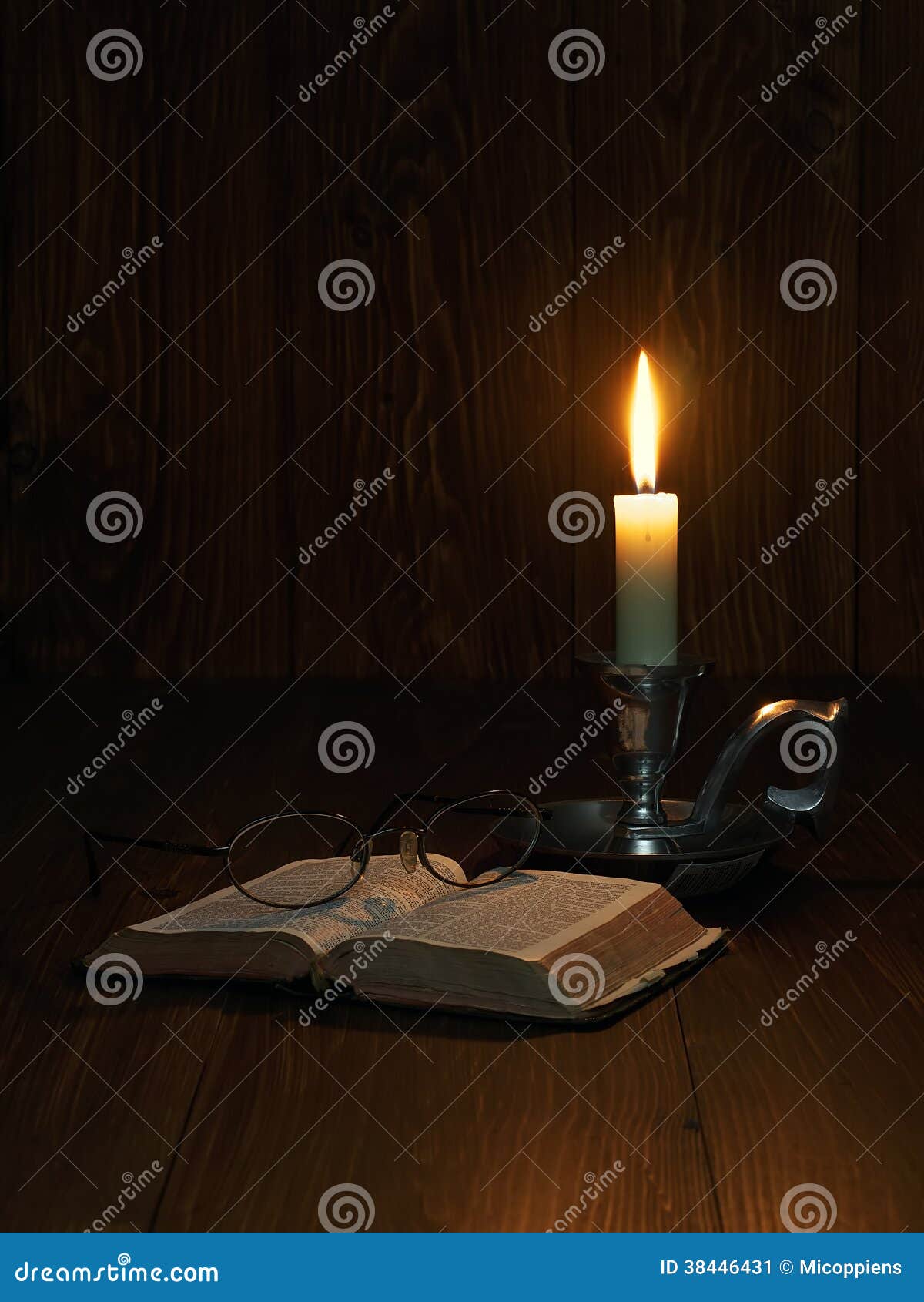 Reading by candlelight stock image. Image of prayerful - 38446431