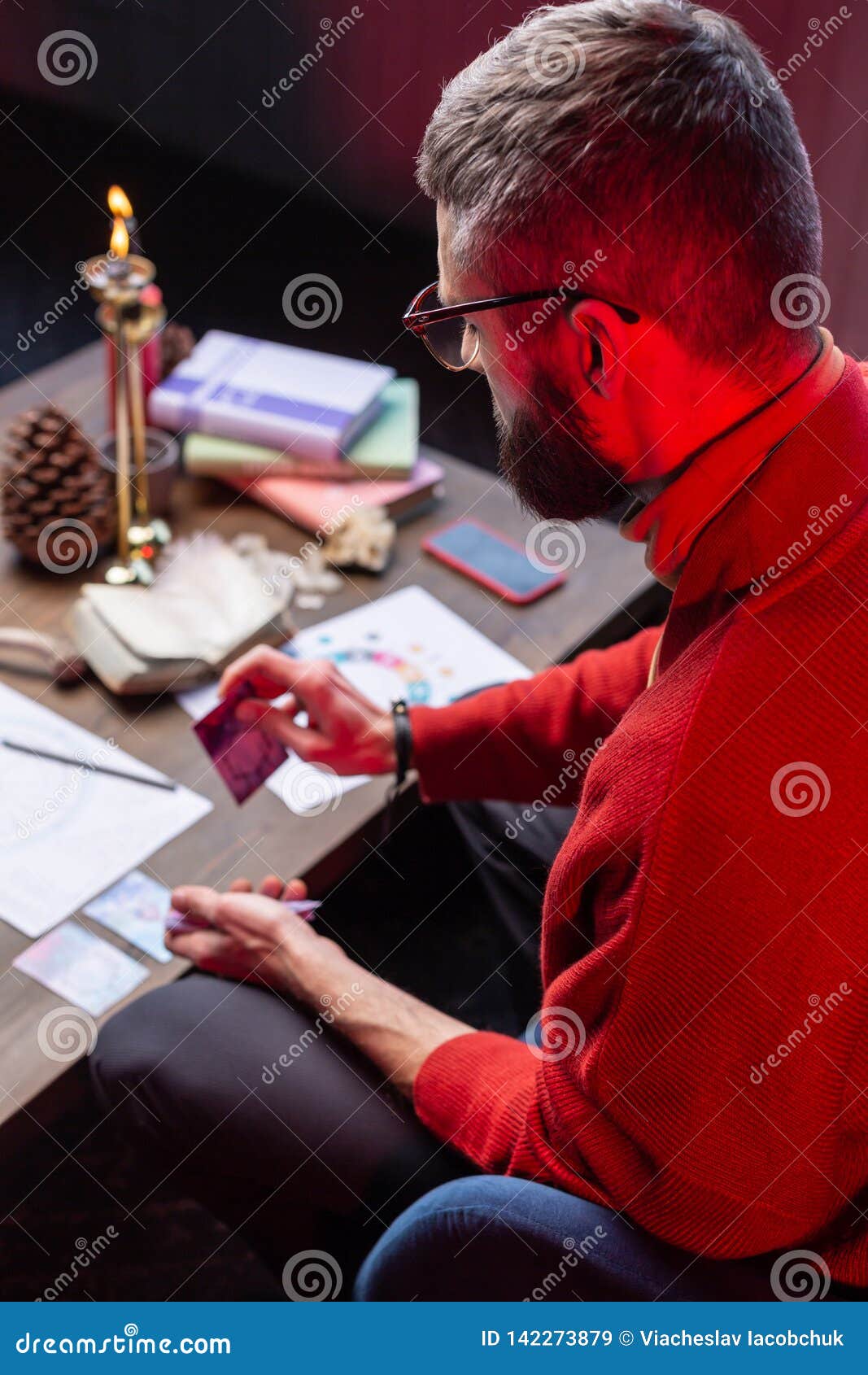 Top View of Fortune-teller Reading Oracle Cards Sitting at the Table ...