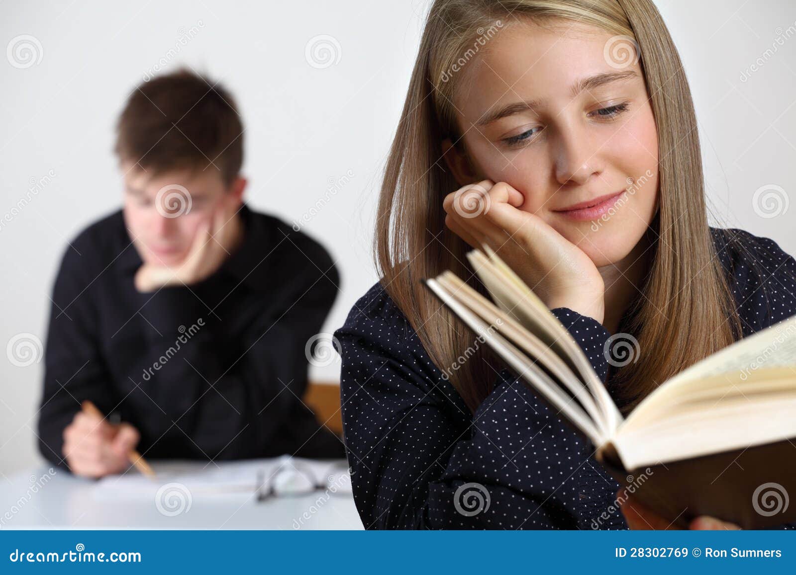 Reading in class stock image. Image of teenager, horizontal - 28302769