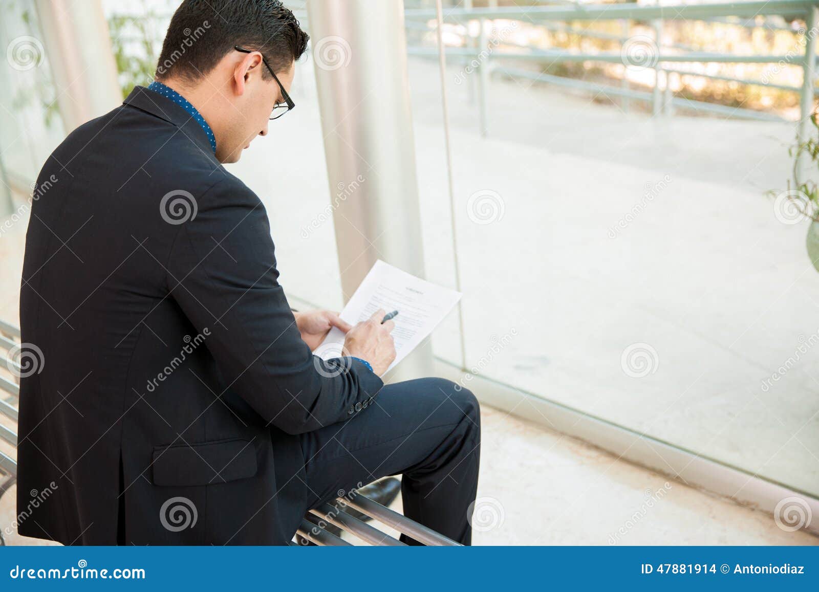 Reading a contract stock photo. Image of color, back - 47881914