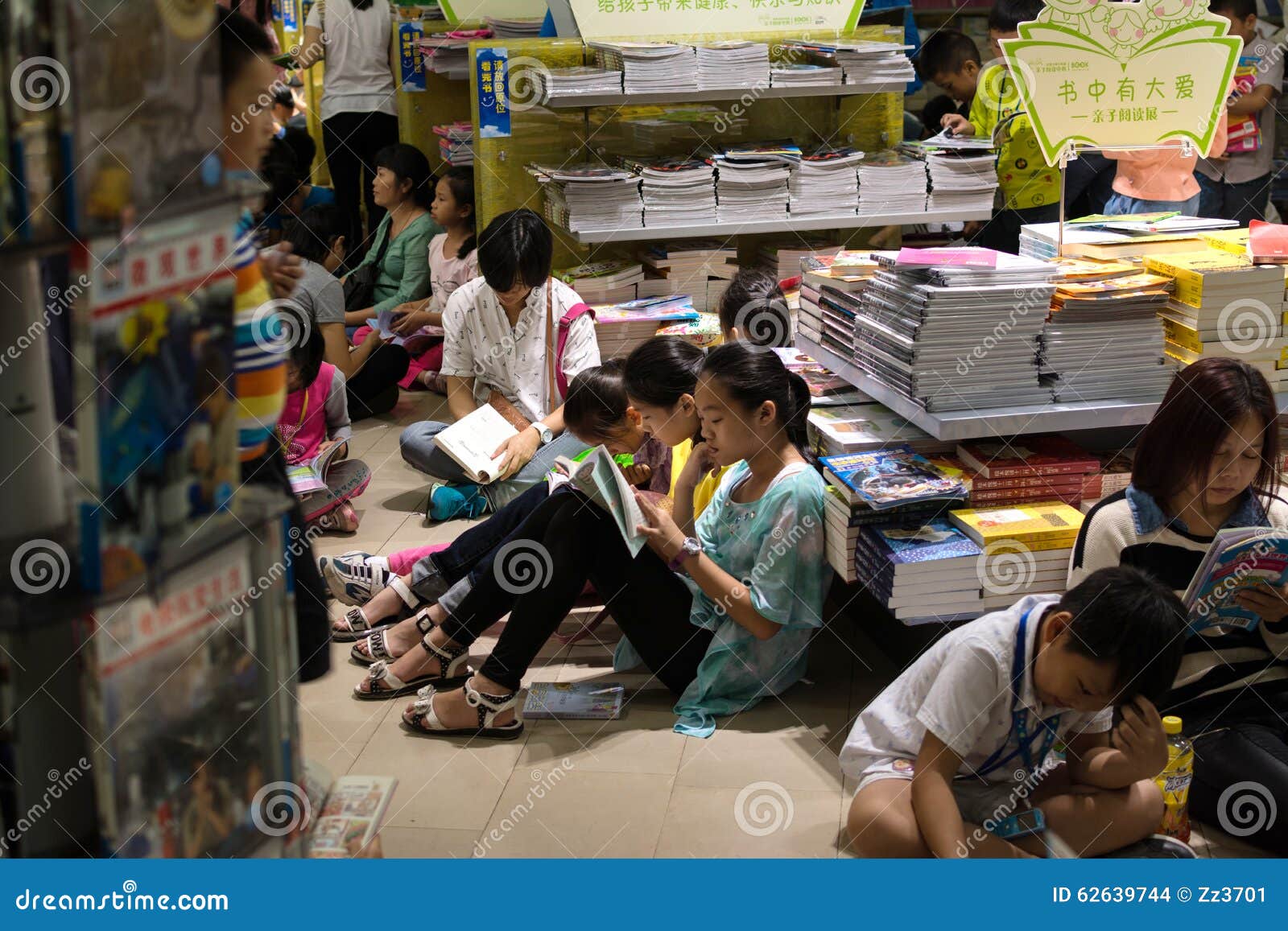 Reading in Crowded Bookstore Editorial Stock Image - Image of concepts ...