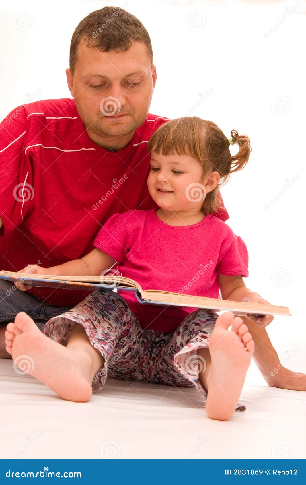 Reading with dad stock image. Image of girls, read, kids - 2831869