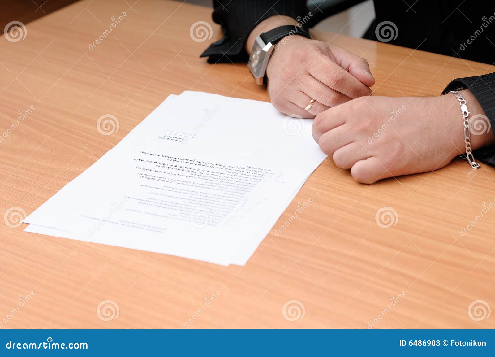 Reading the document stock image. Image of busy, casual - 6486903