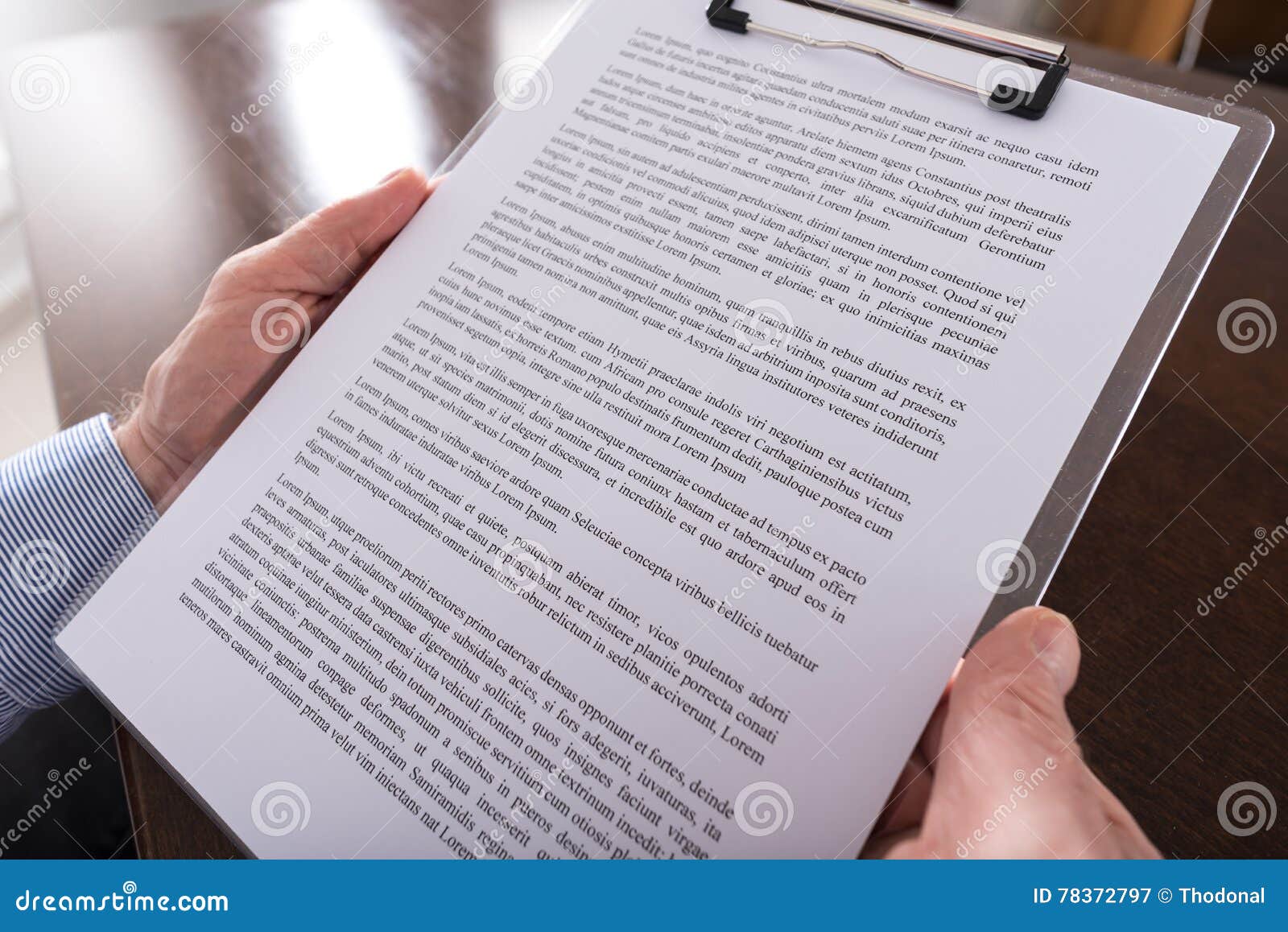 Reading a document stock image. Image of documentation - 78372797