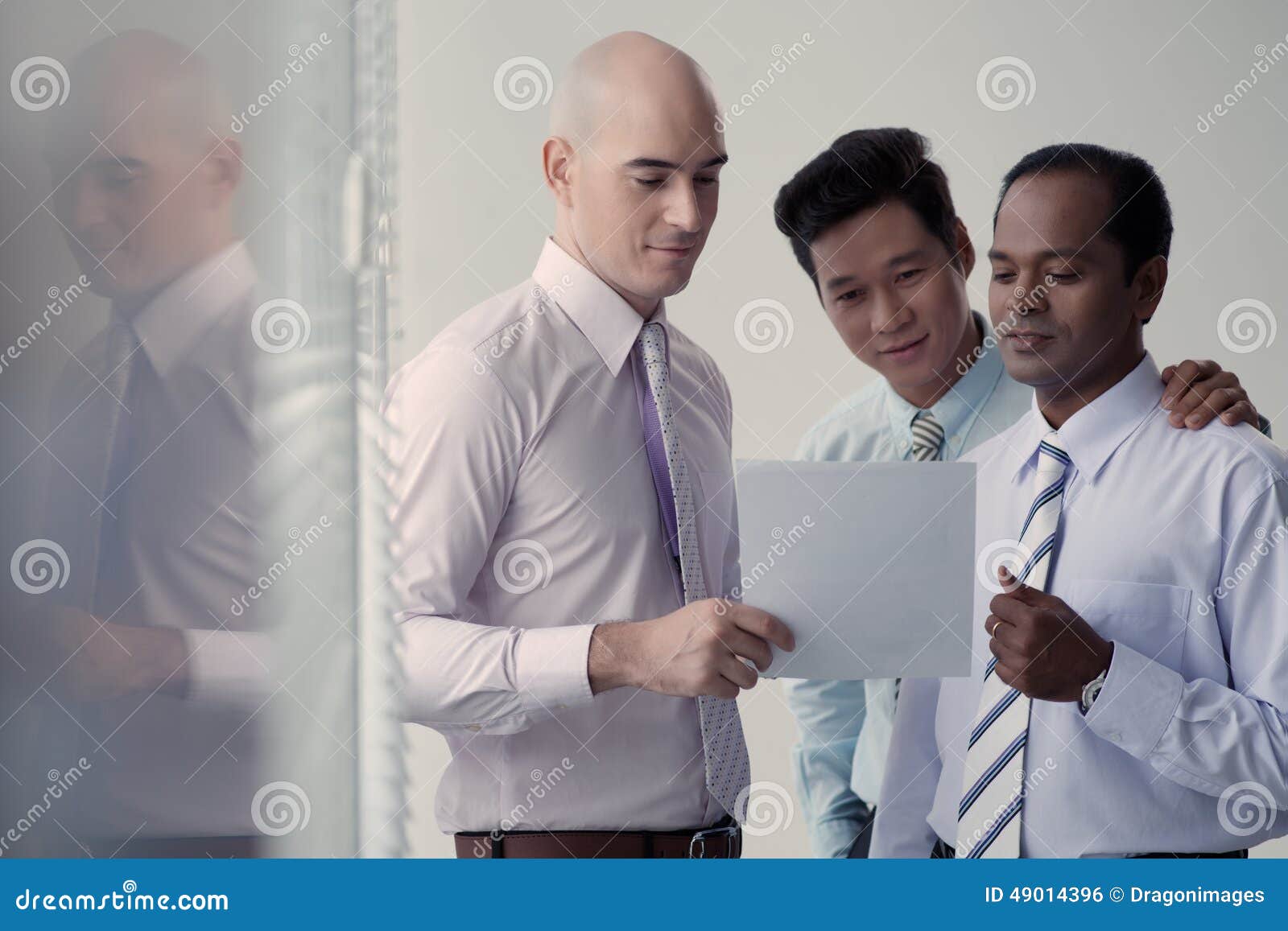 Reading document stock photo. Image of executive, together - 49014396