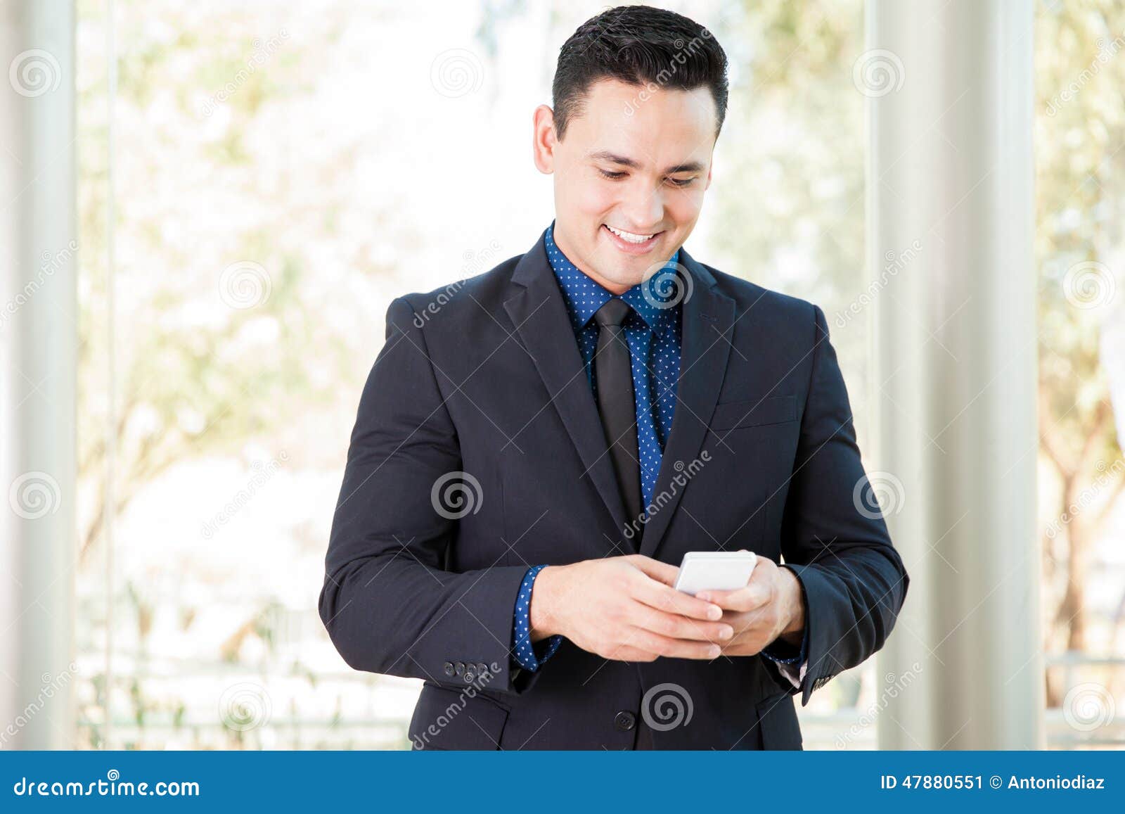 Reading emails on a phone stock image. Image of latin - 47880551
