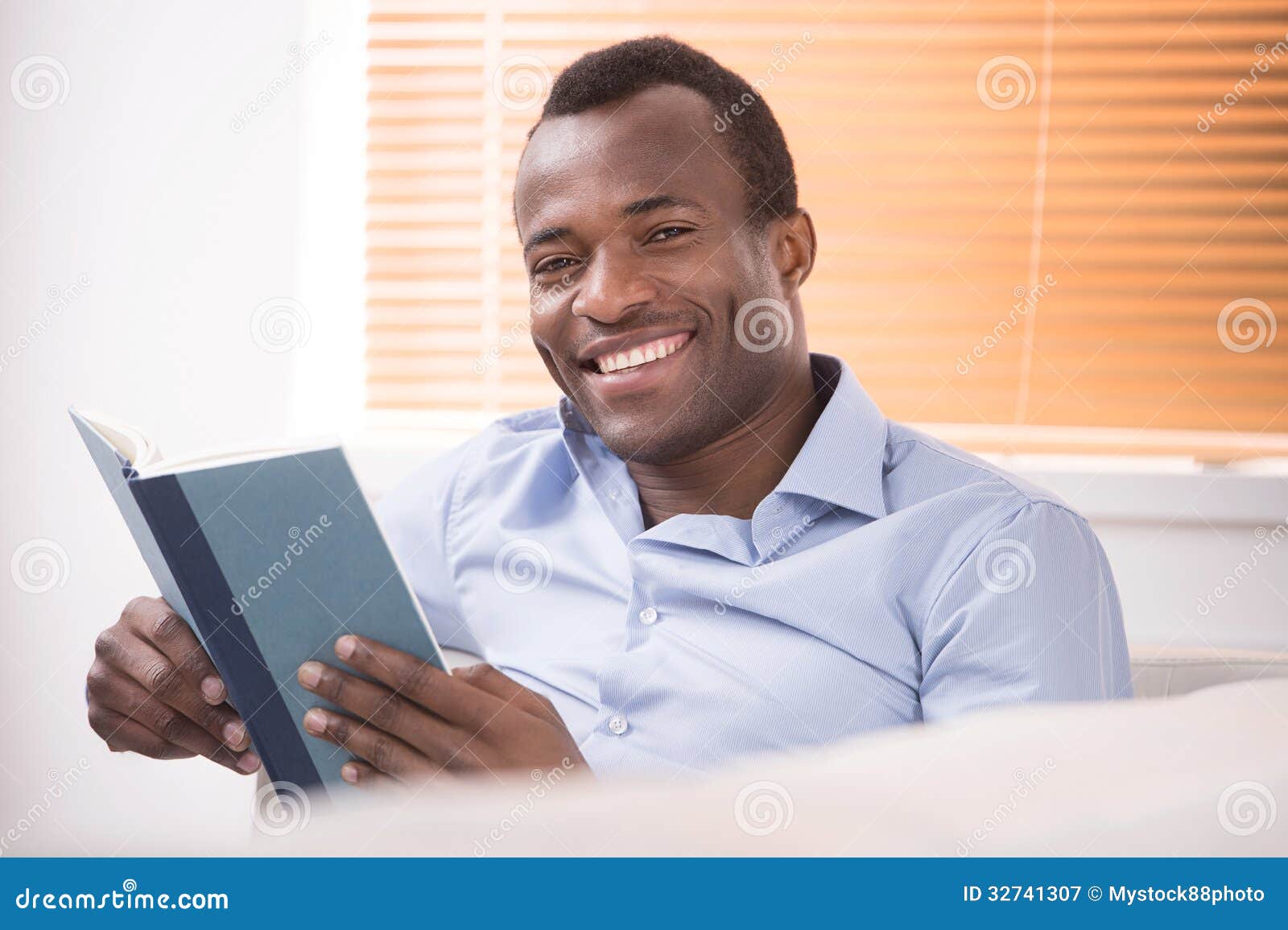 Reading an exciting book. stock image. Image of domestic - 32741307