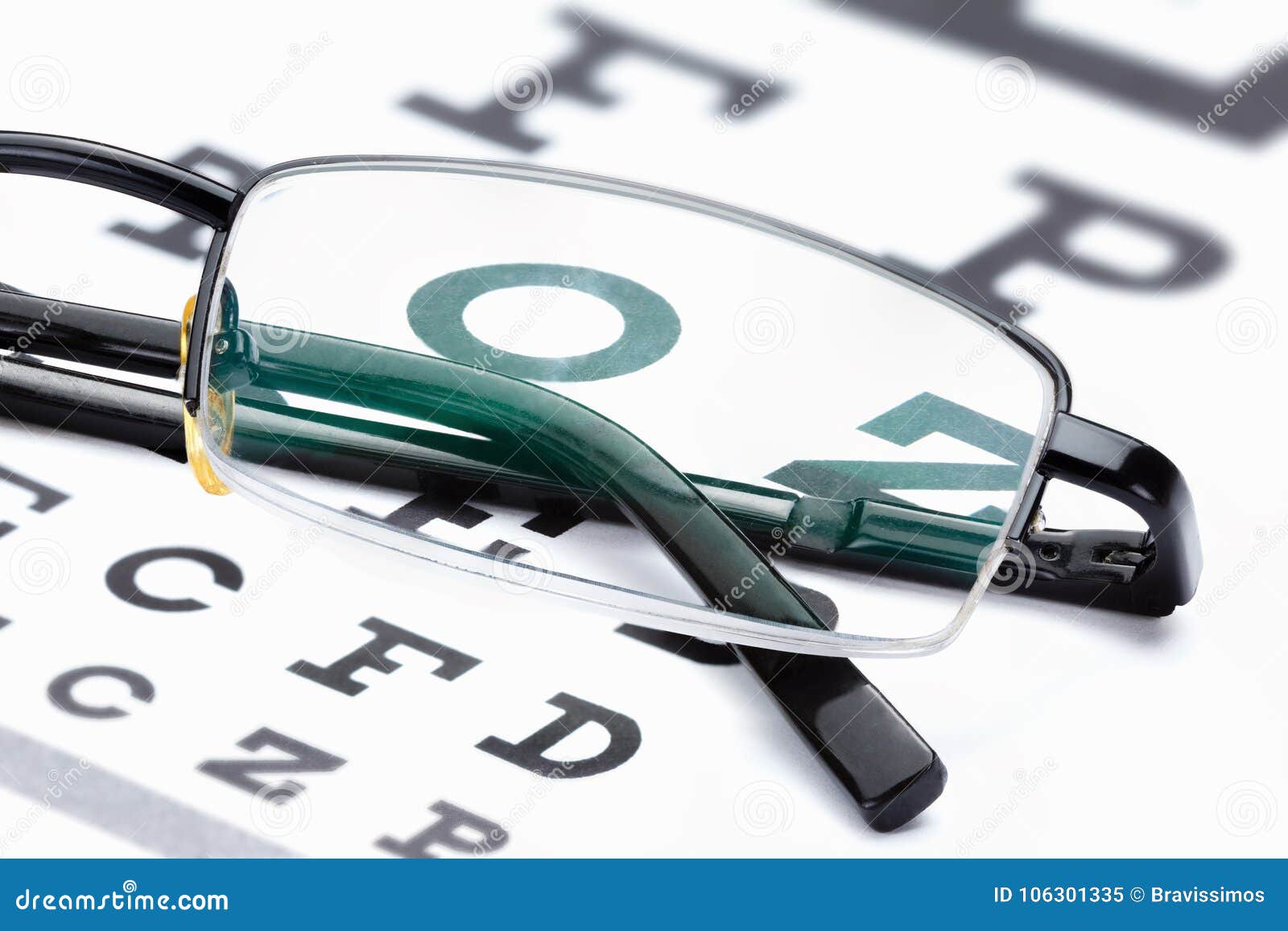 Reading Eye Glasses with Eye Chart on White Stock Image - Image of lens ...