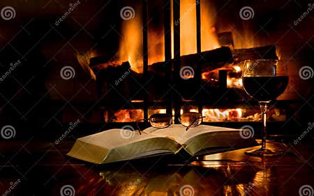 Reading by firelight stock photo. Image of fireplace, reading - 1685622