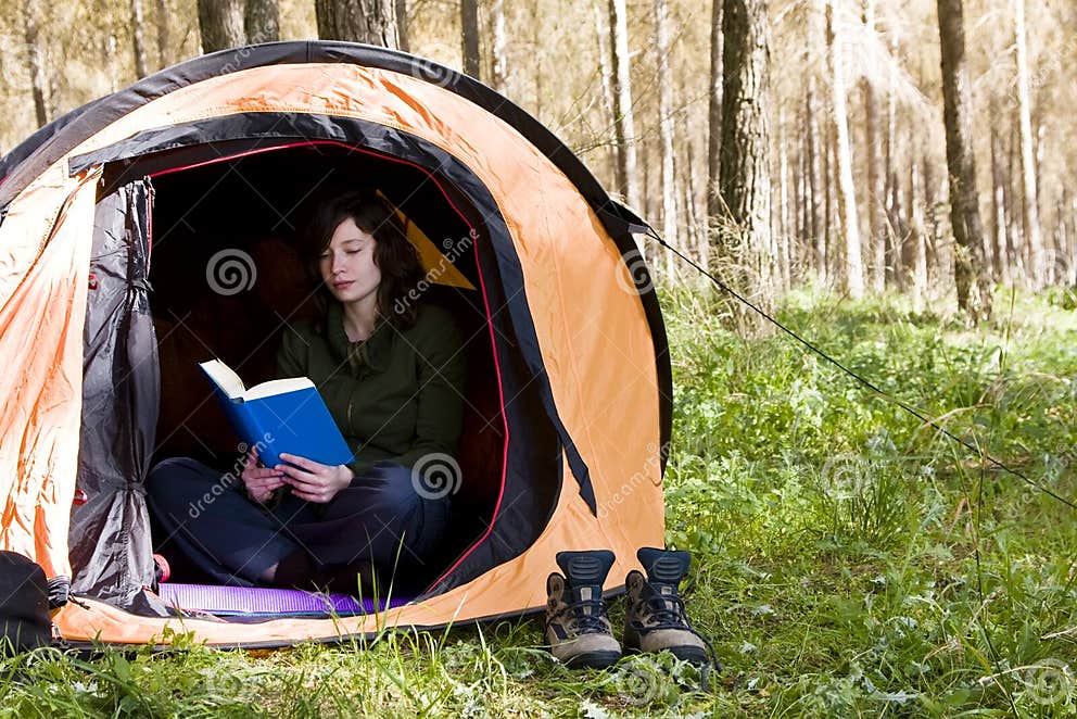 Reading in the forest stock image. Image of book, spring - 5064463