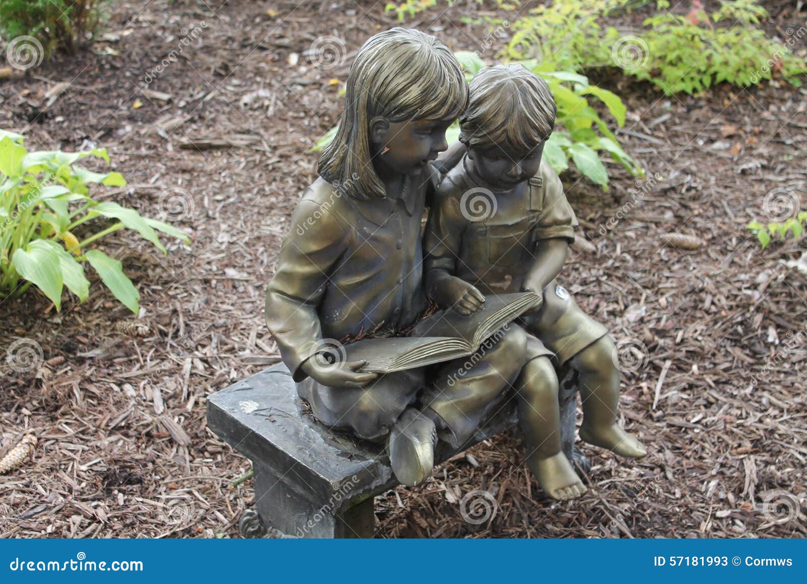 Statue Of A Man Reading A Book Of Historic Bismarck Memorial In The ...