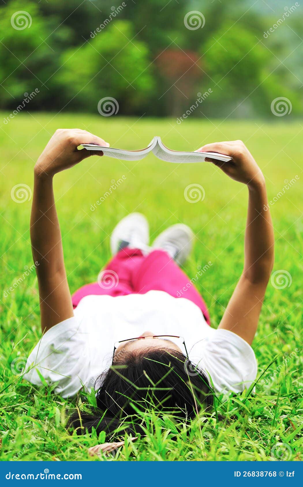 Reading in garden stock photo. Image of closeup, asian - 26838768