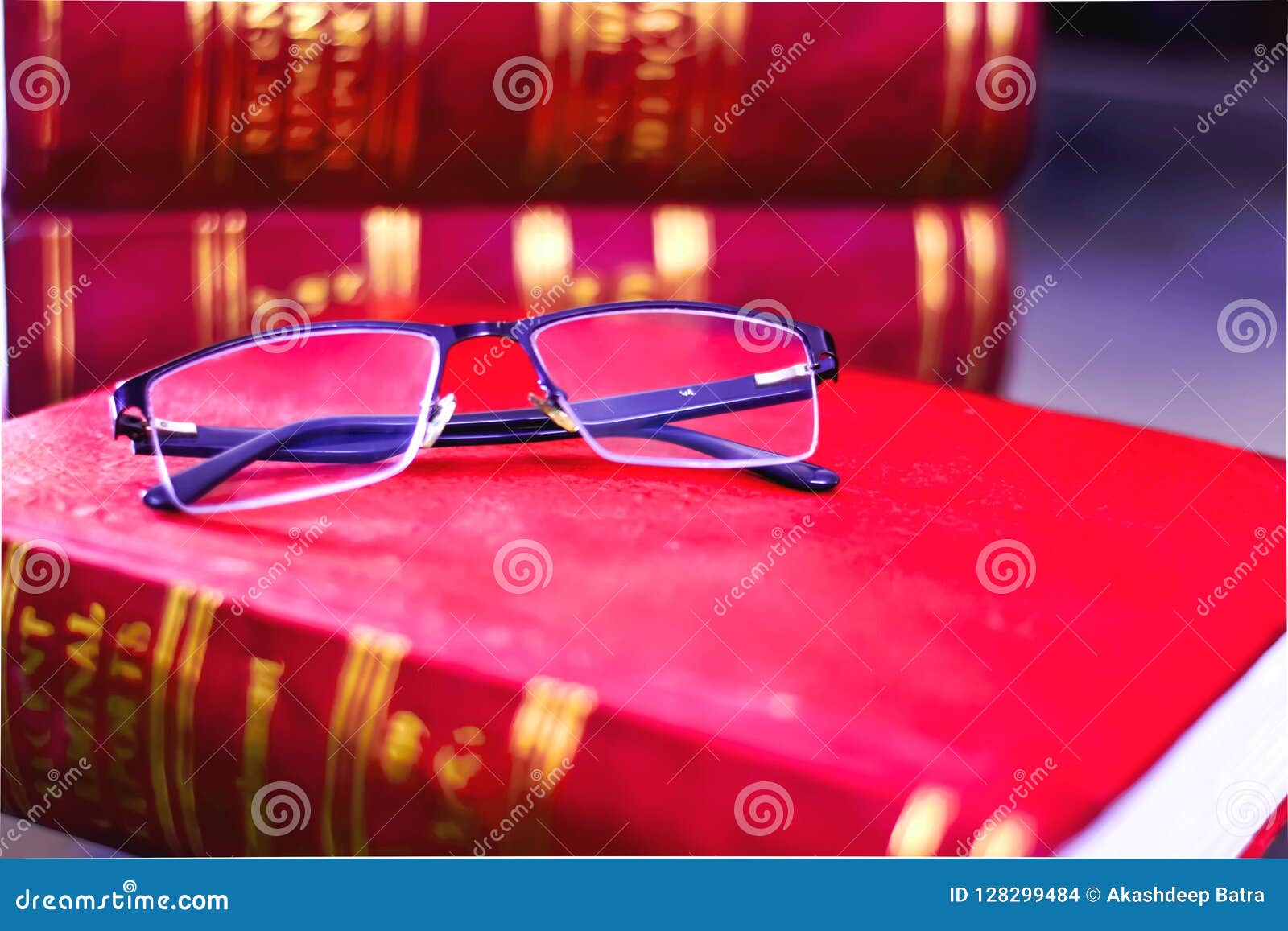 READING GLASS on LAW BOOKS in a LIBRARY Stock Photo - Image of ...
